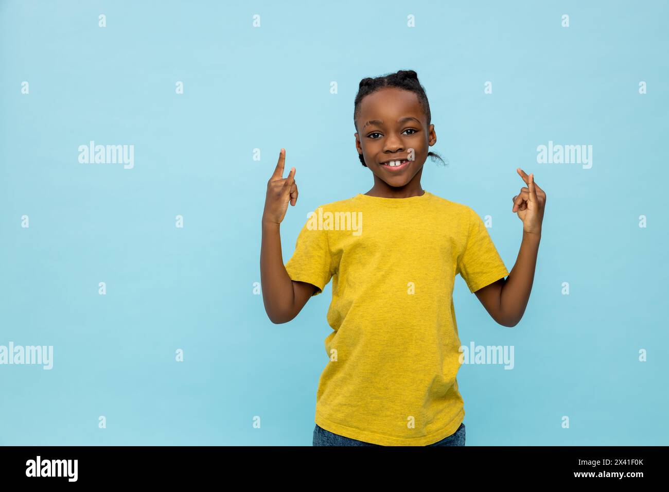 Excited school age black boy hi-res stock photography and images - Alamy