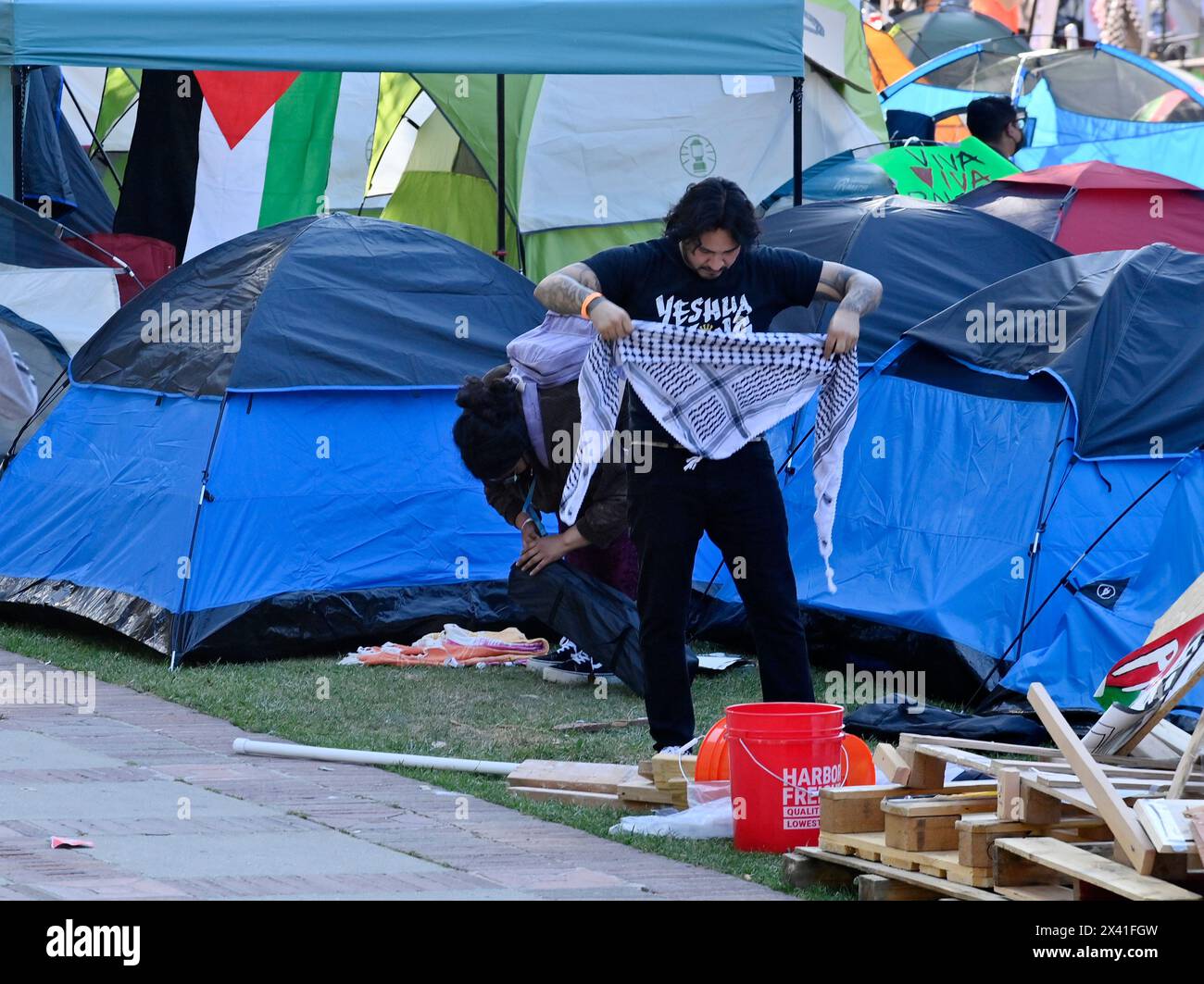 A pro-Palestinian encampment is seen cordoned off by stanchions on the ...