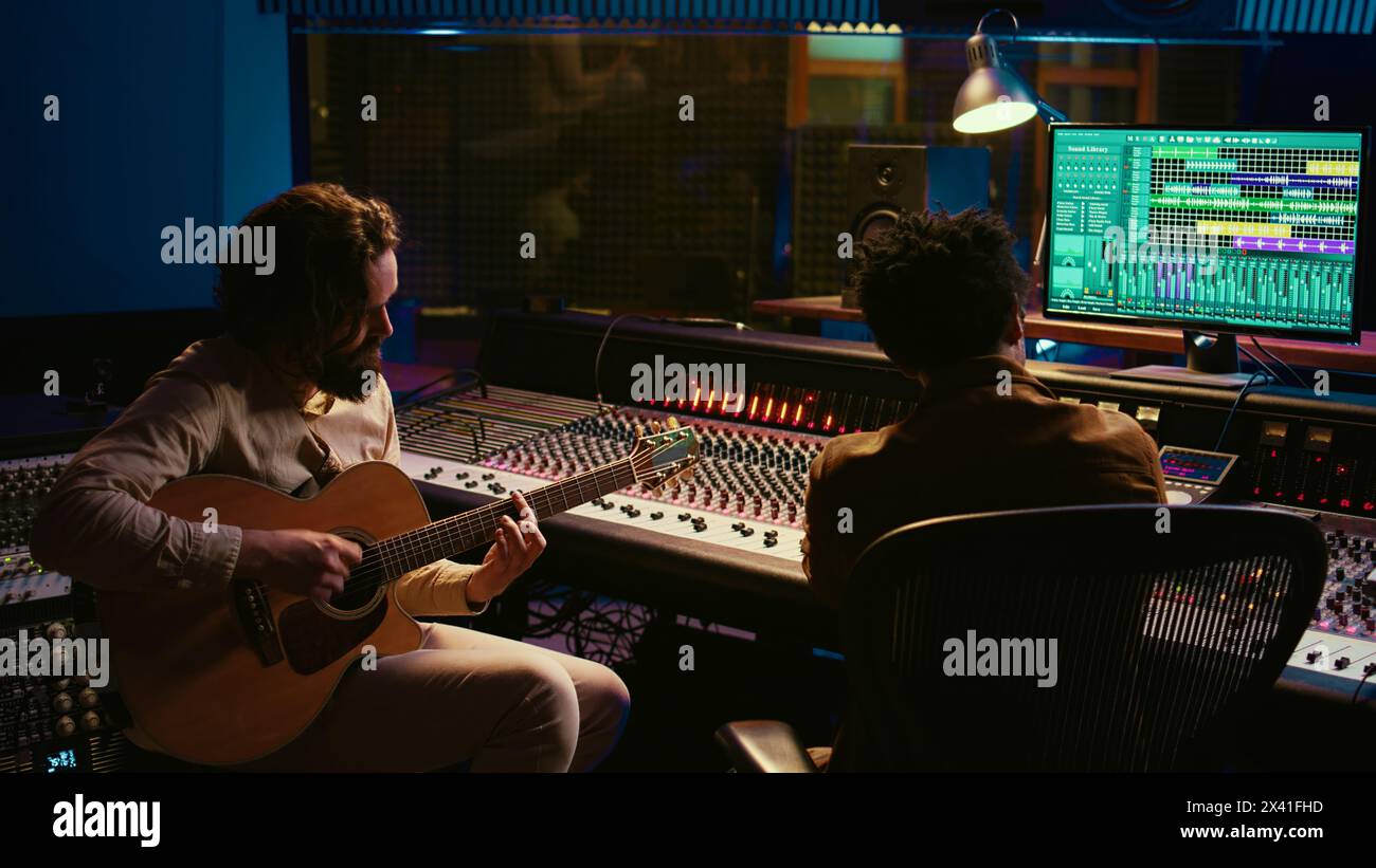 Recording booth guitarist hi-res stock photography and images - Alamy
