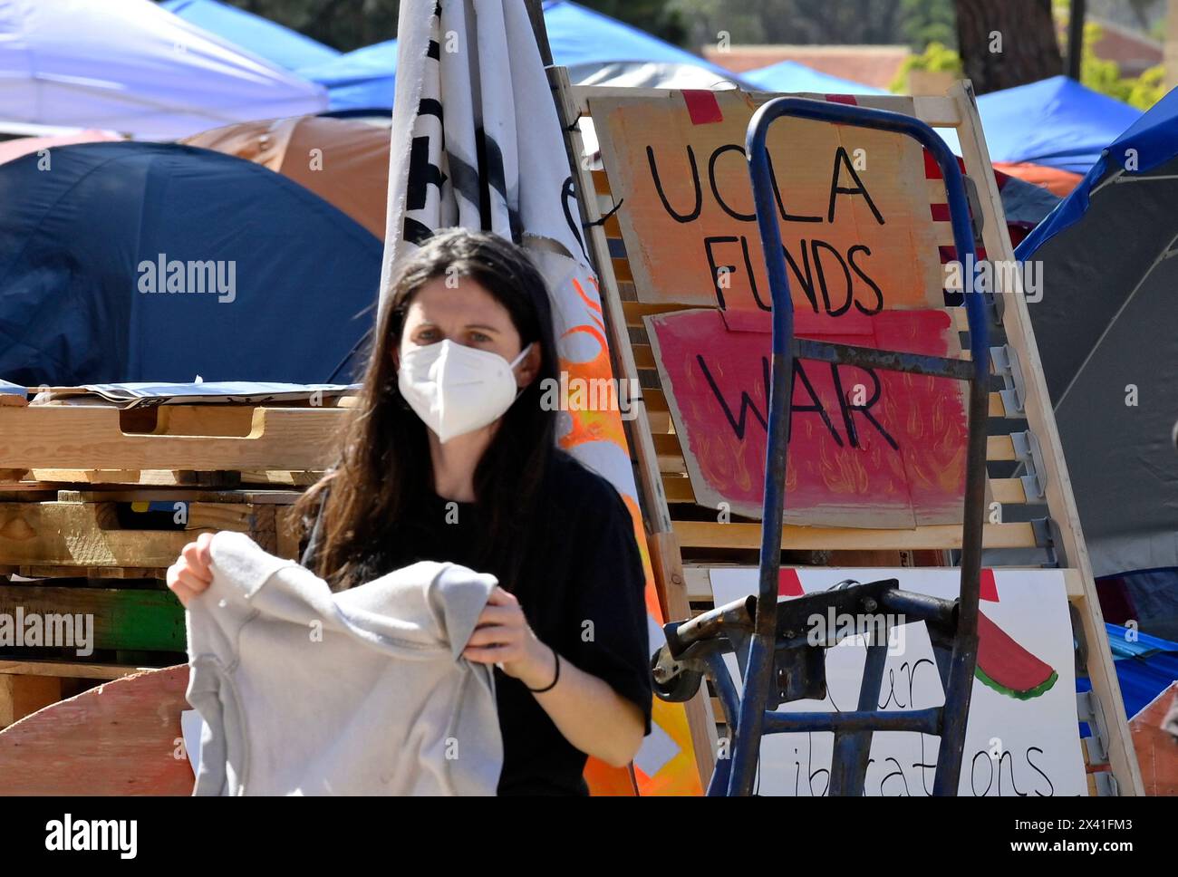 A pro-Palestinian encampment is seen cordoned off by stanchions on the ...