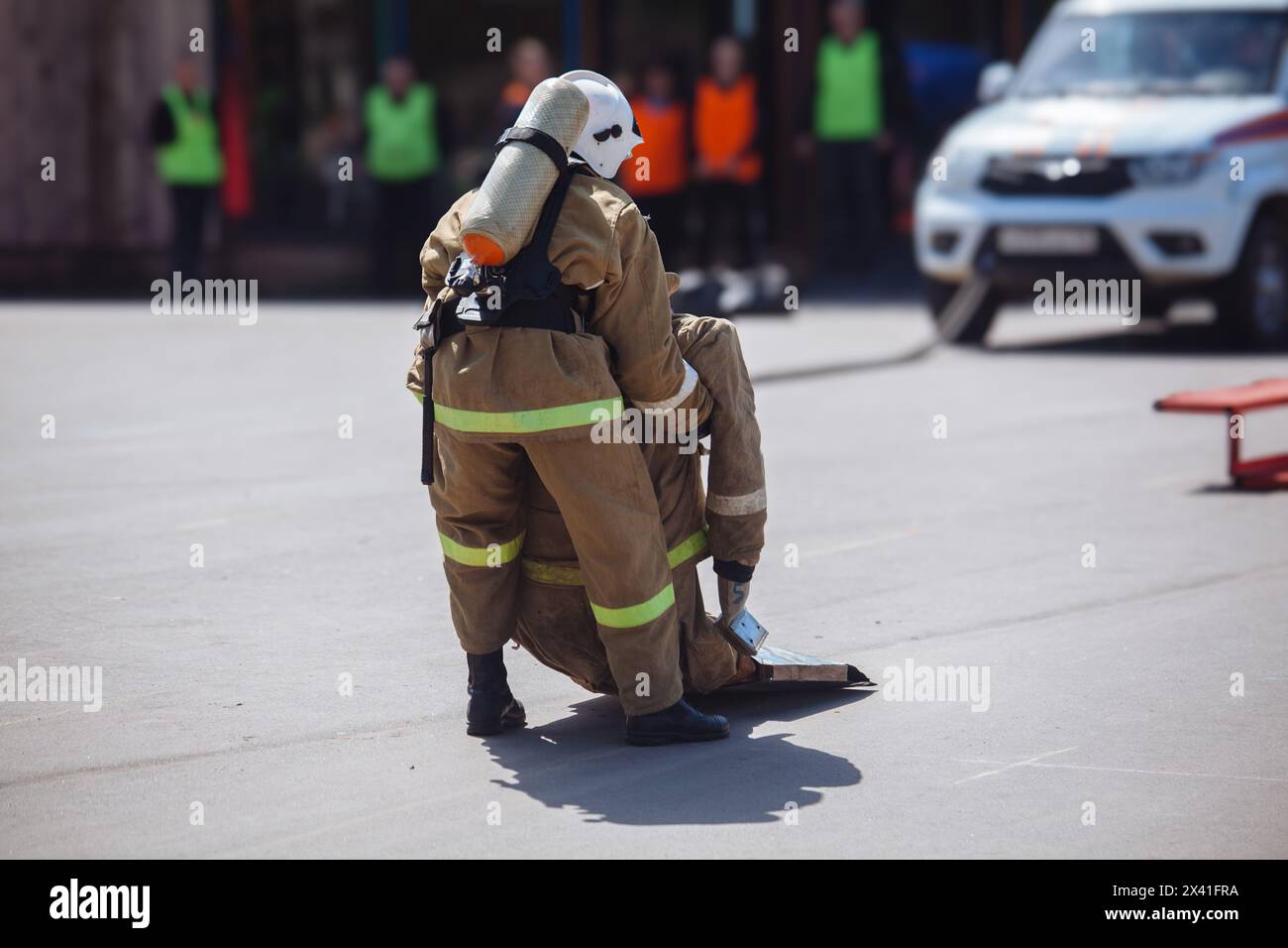 Fireman carry hi-res stock photography and images - Alamy