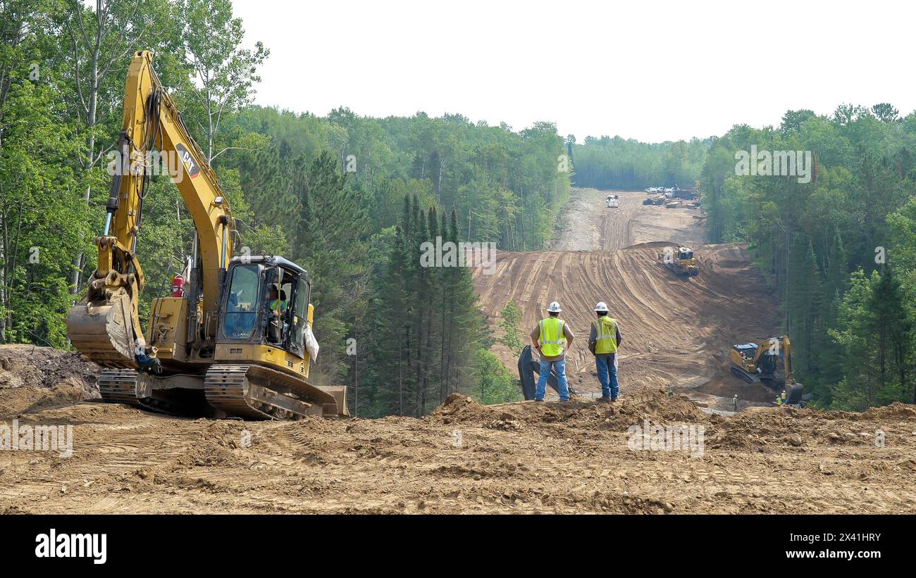 CASS CO, MN - 6 AUG 2021: Workers and excavator at the Enbridge Line 3 ...