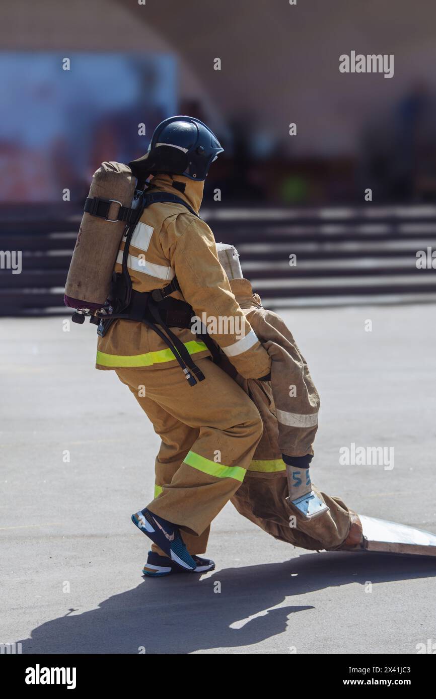 Fireman carry hi-res stock photography and images - Alamy