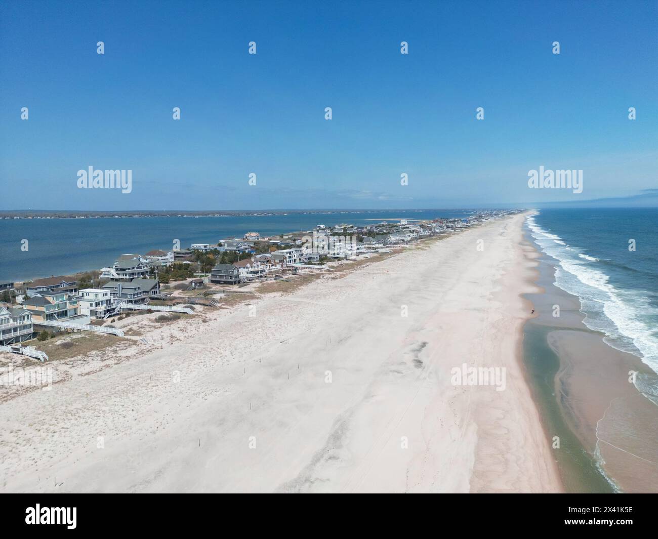 view of luxury homes along the beach in the Hamptons Long Island New ...