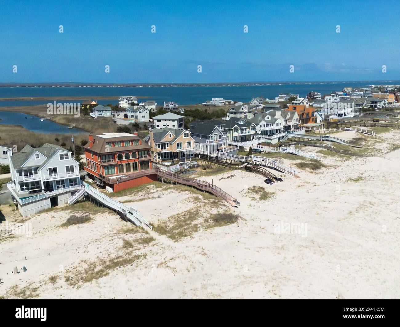 view of luxury homes along the beach in the Hamptons Long Island New ...