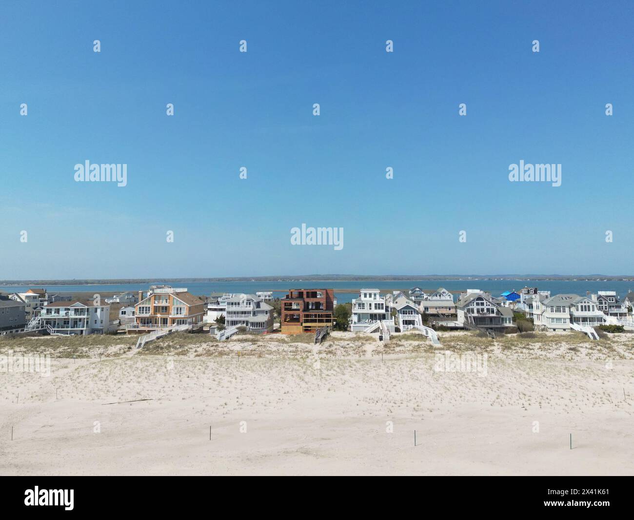 view of luxury homes along the beach in the Hamptons Long Island New ...