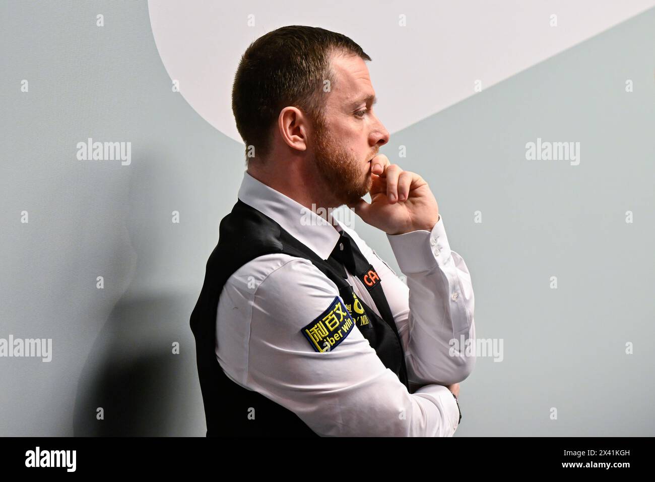 Mark Allen watches on, during the Cazoo World Championships 2024 at ...