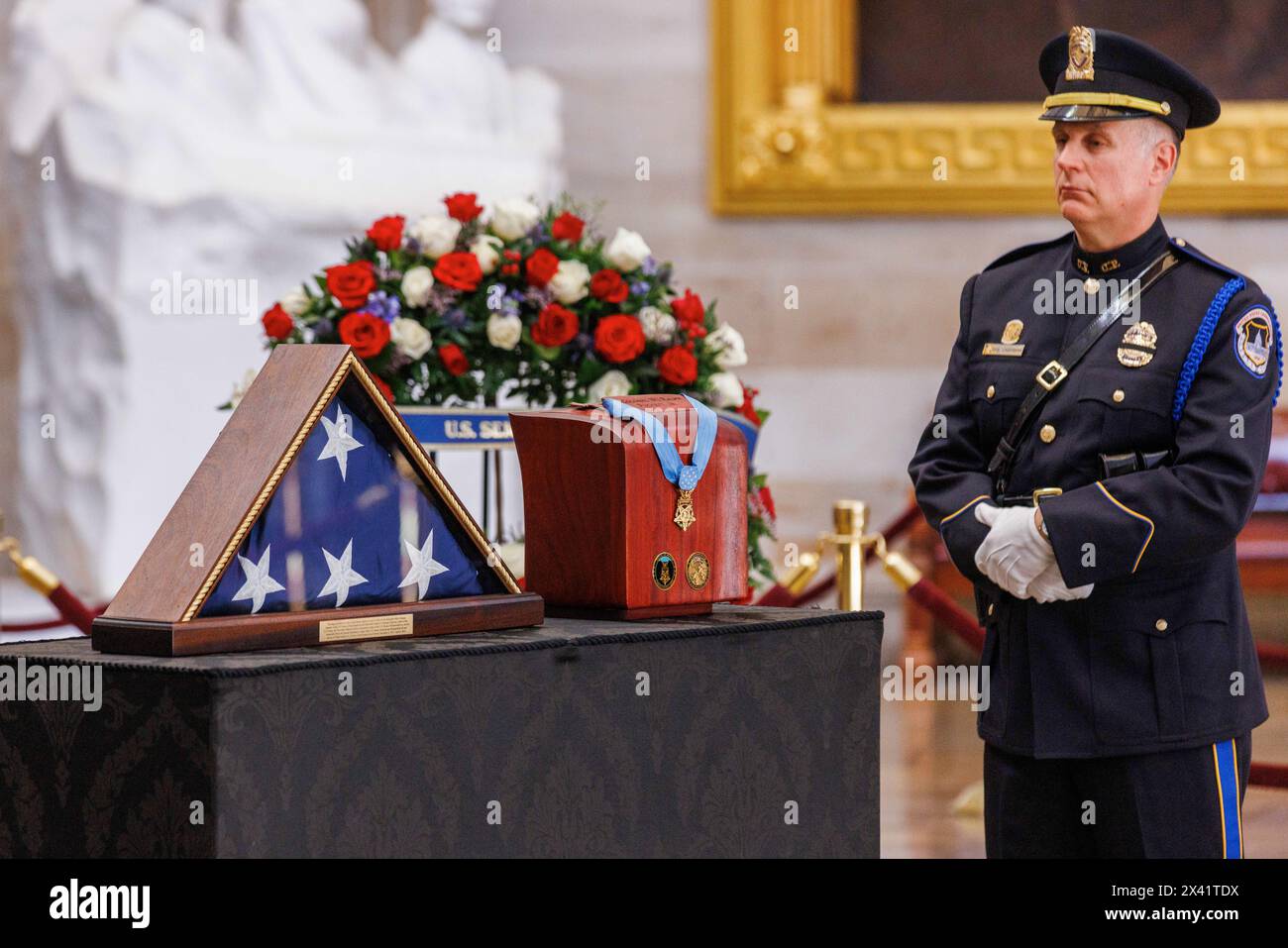 Capitol Police Honor Guard watch over the remains of US Army Col. Ralph ...