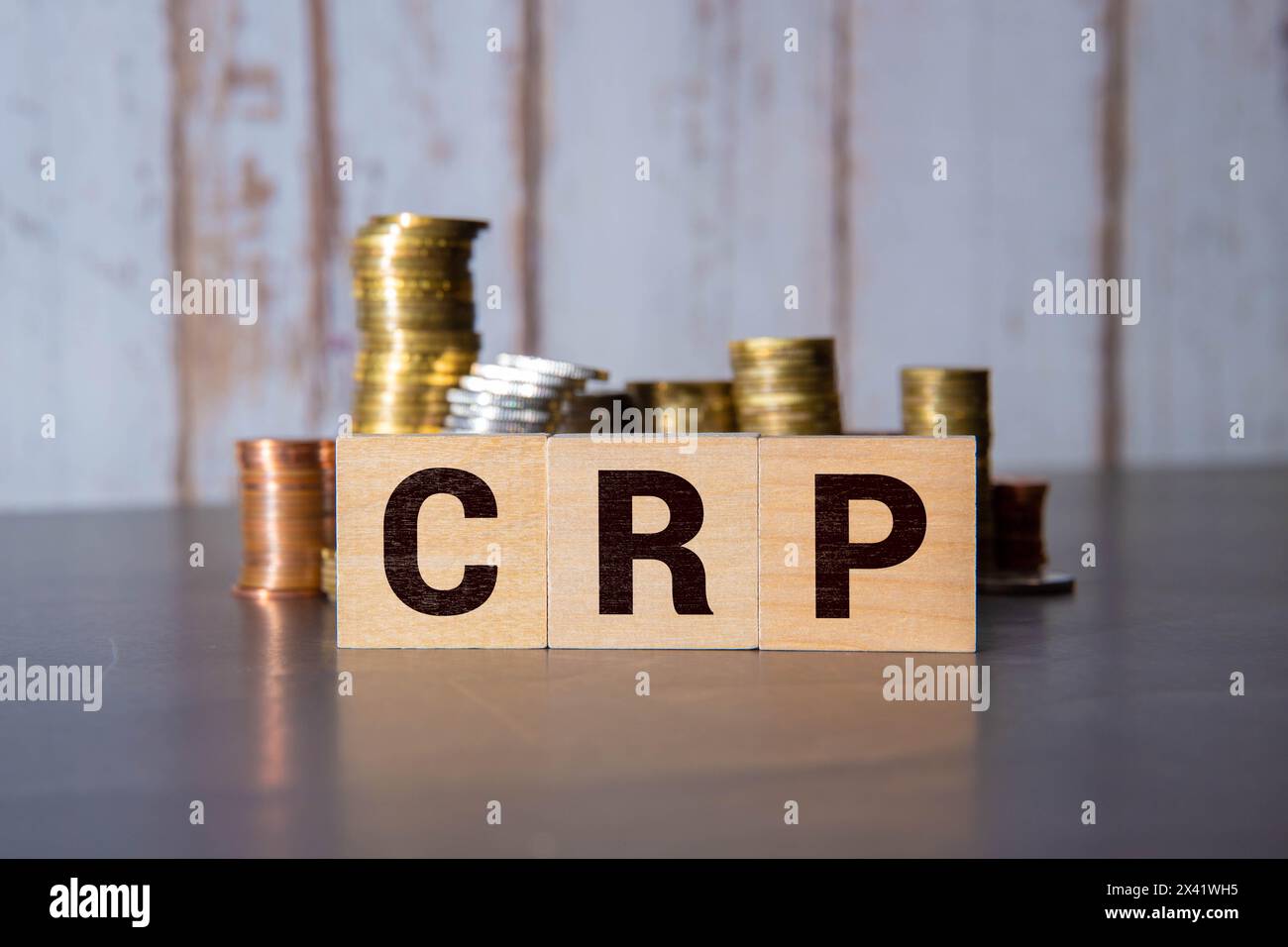 CRP - C-Reactive Protein Test symbol. Wooden cubes with word CRP ...