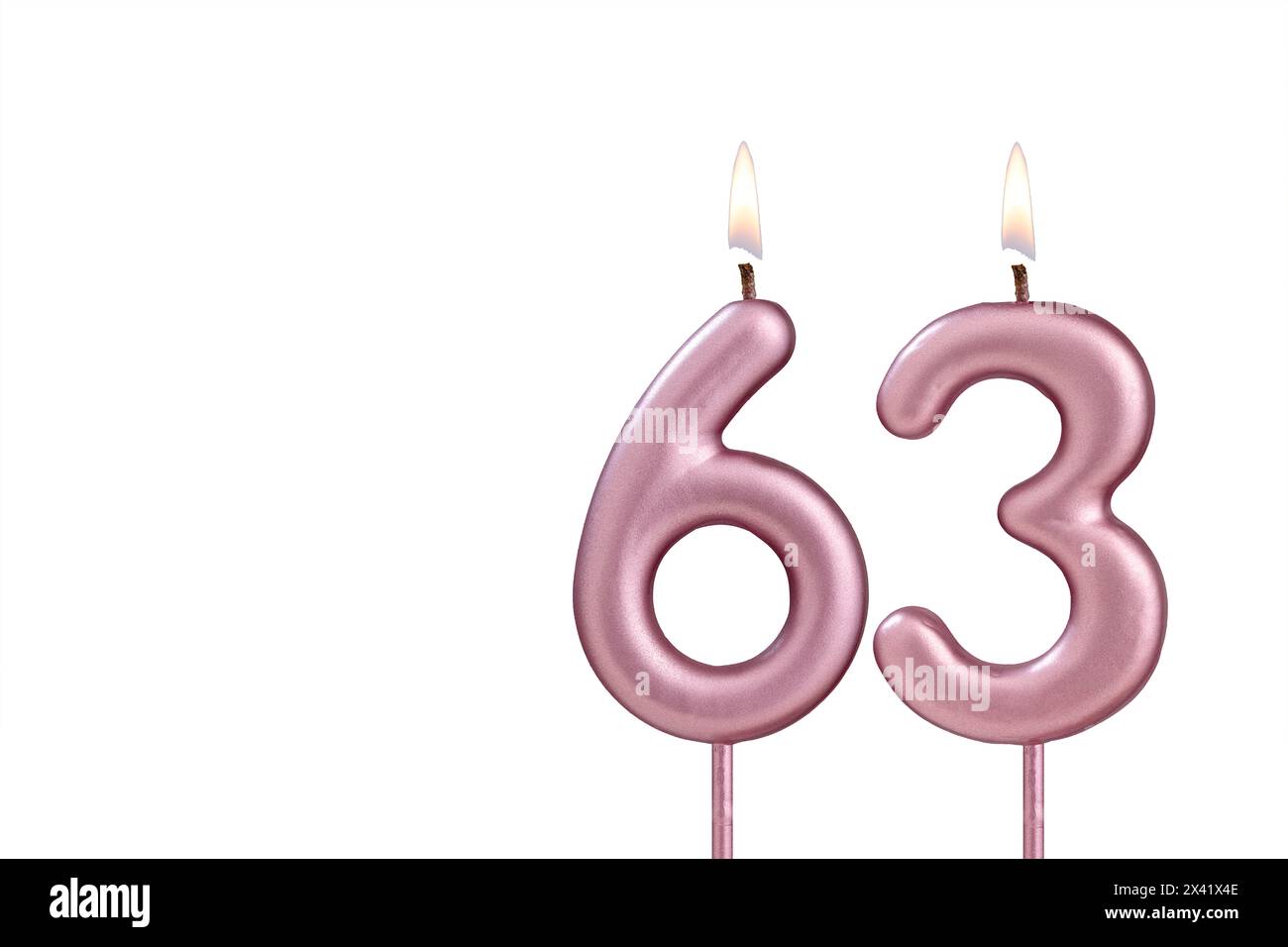 Candle number 63 - Lit birthday candle on white background Stock Photo ...