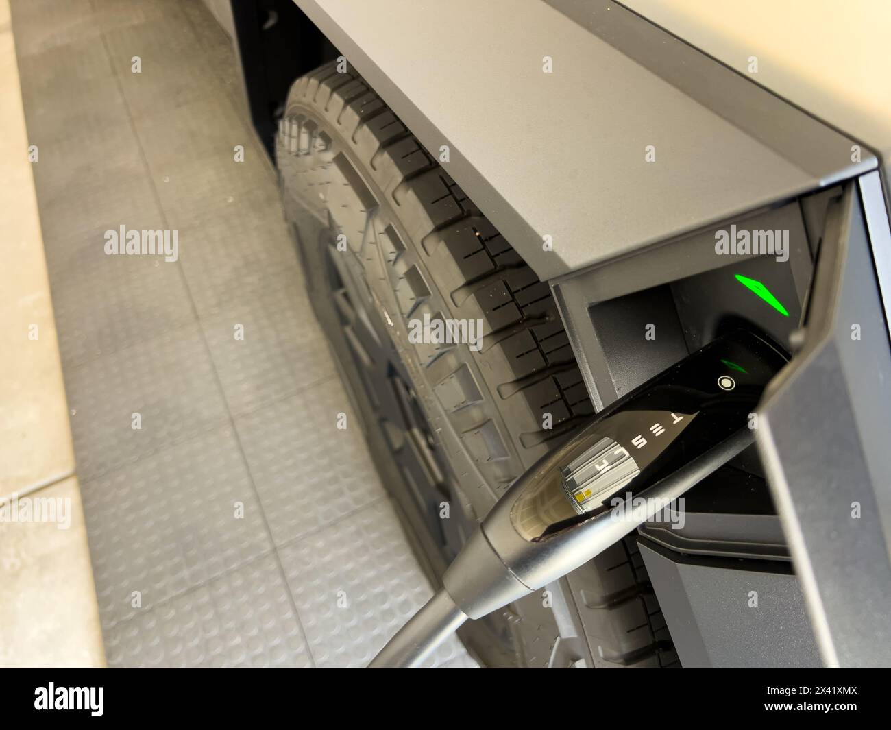 Charging a Tesla Cybertruck with a Home EV Charger in Suburban Garage ...