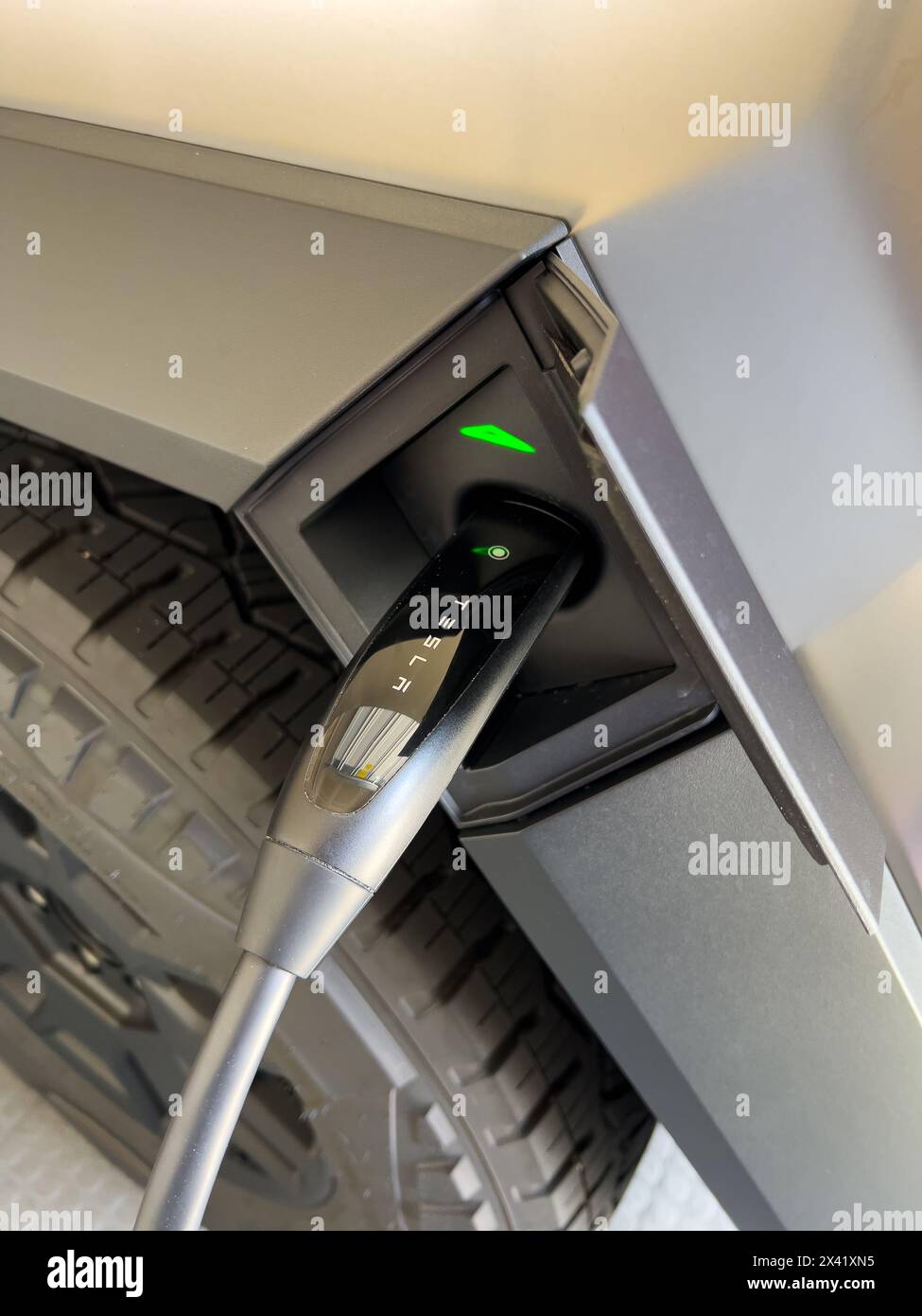 Charging a Tesla Cybertruck with a Home EV Charger in Suburban Garage ...