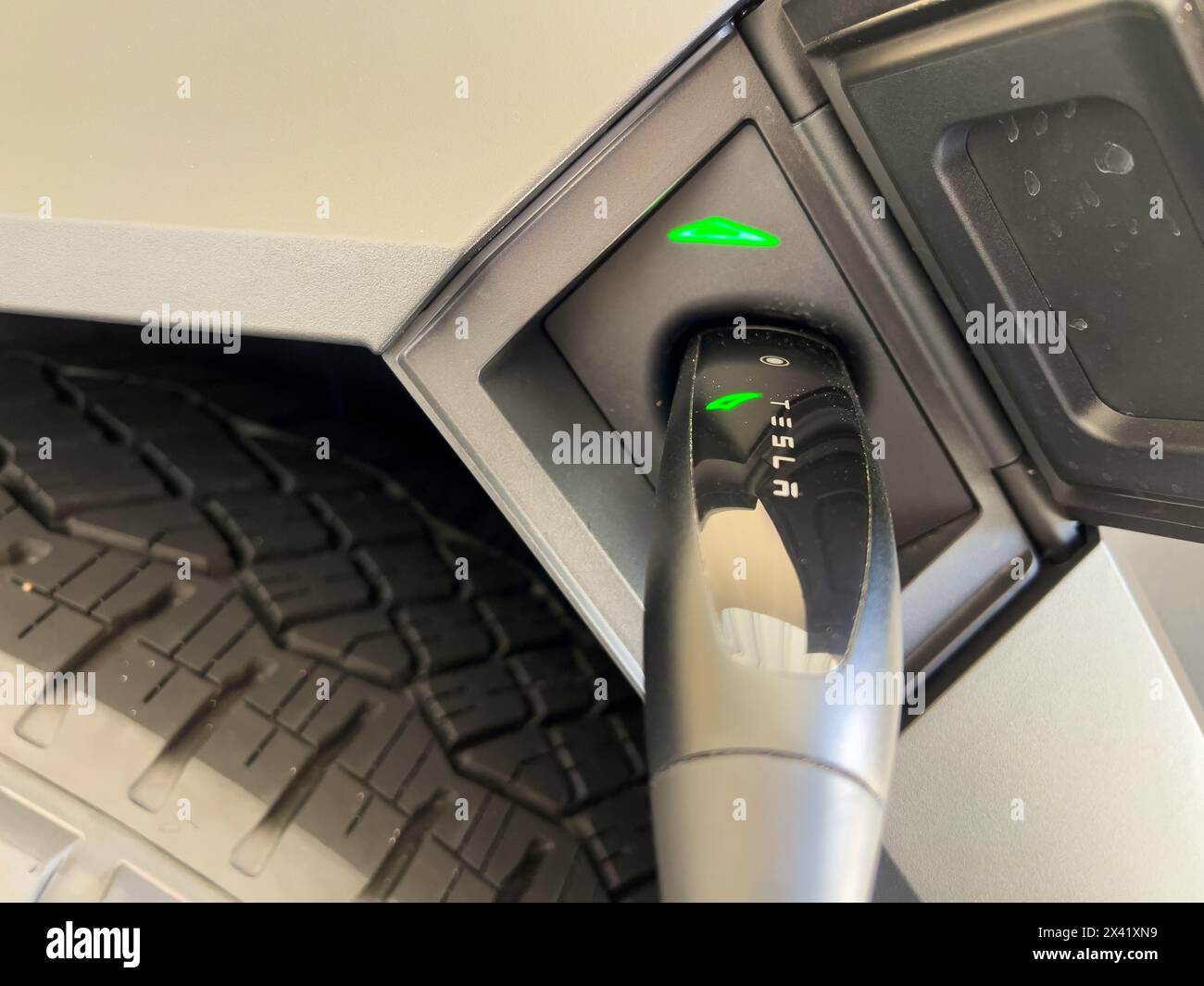 Charging a Tesla Cybertruck with a Home EV Charger in Suburban Garage ...