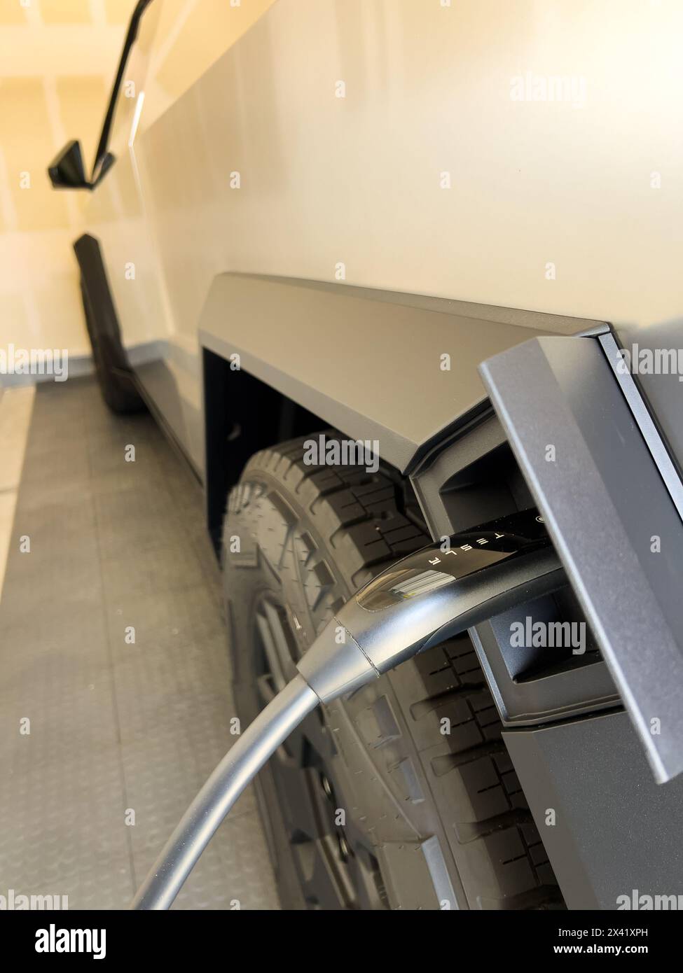 Charging a Tesla Cybertruck with a Home EV Charger in Suburban Garage ...