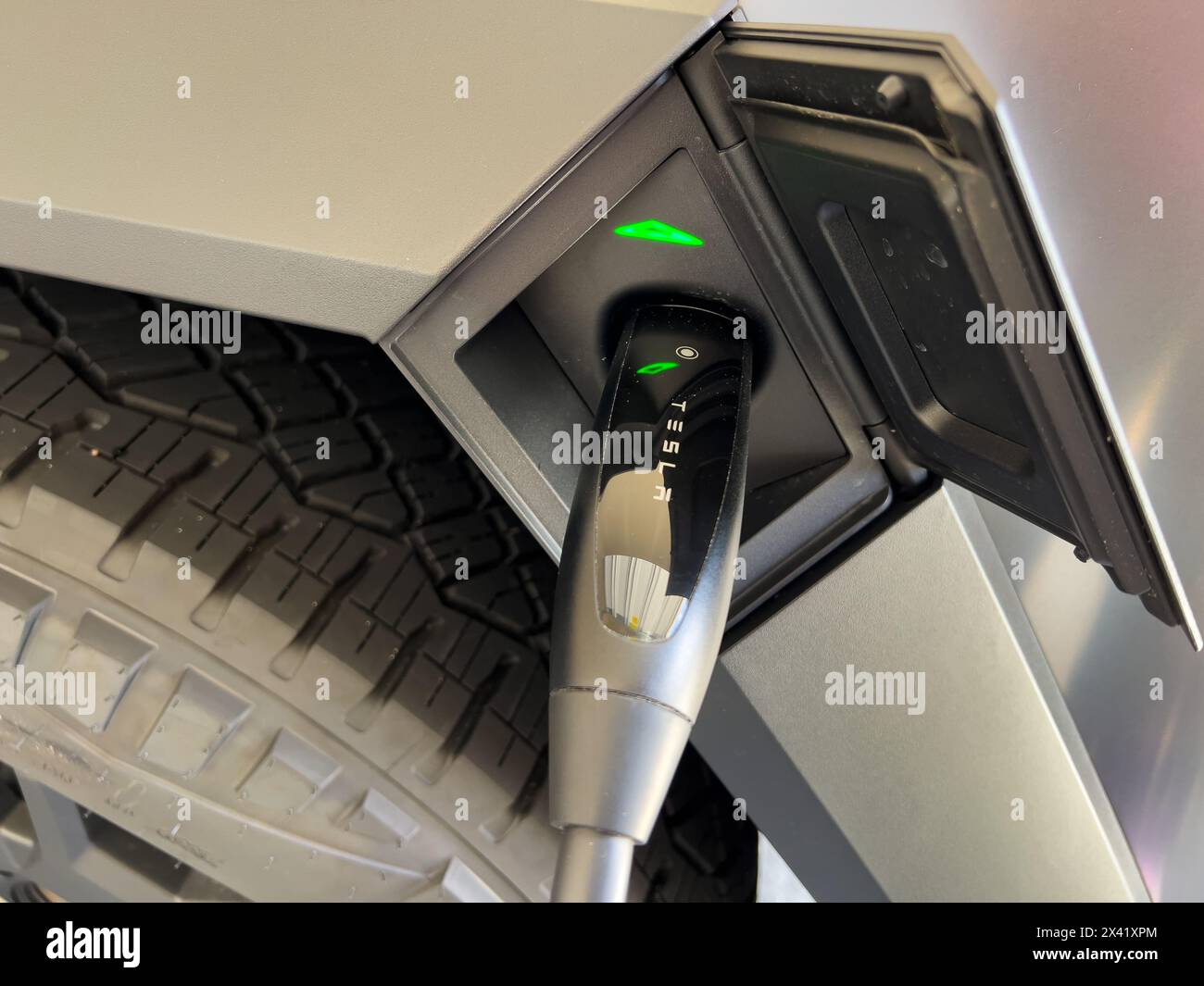 Charging a Tesla Cybertruck with a Home EV Charger in Suburban Garage ...