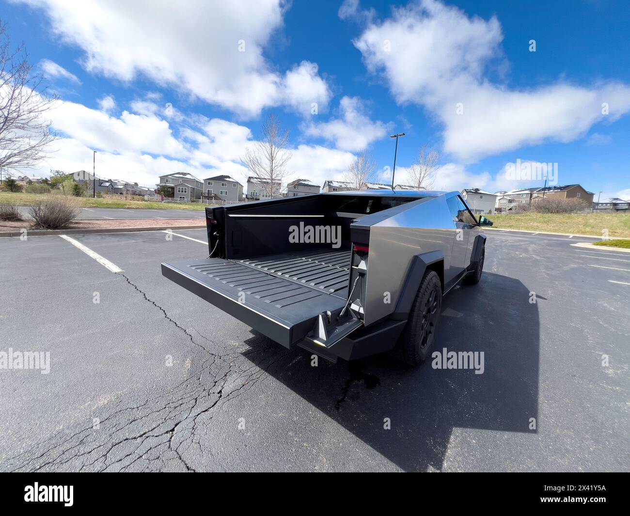 Back View of a Tesla Cybertruck in an Empty Suburban Parking Lot Stock ...