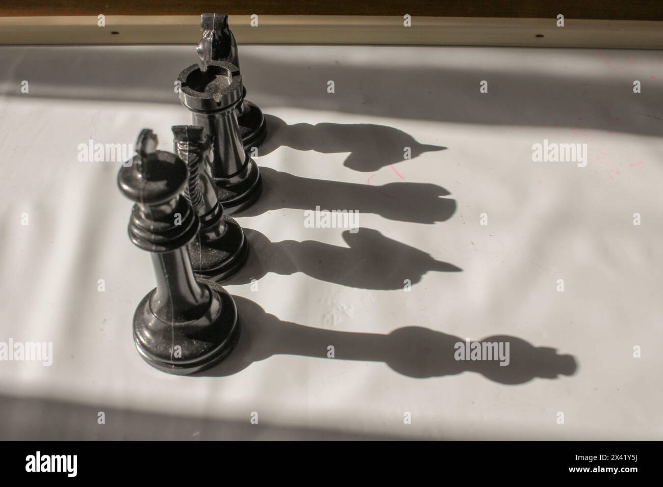 Chess pieces shadows on chess hi-res stock photography and images - Alamy