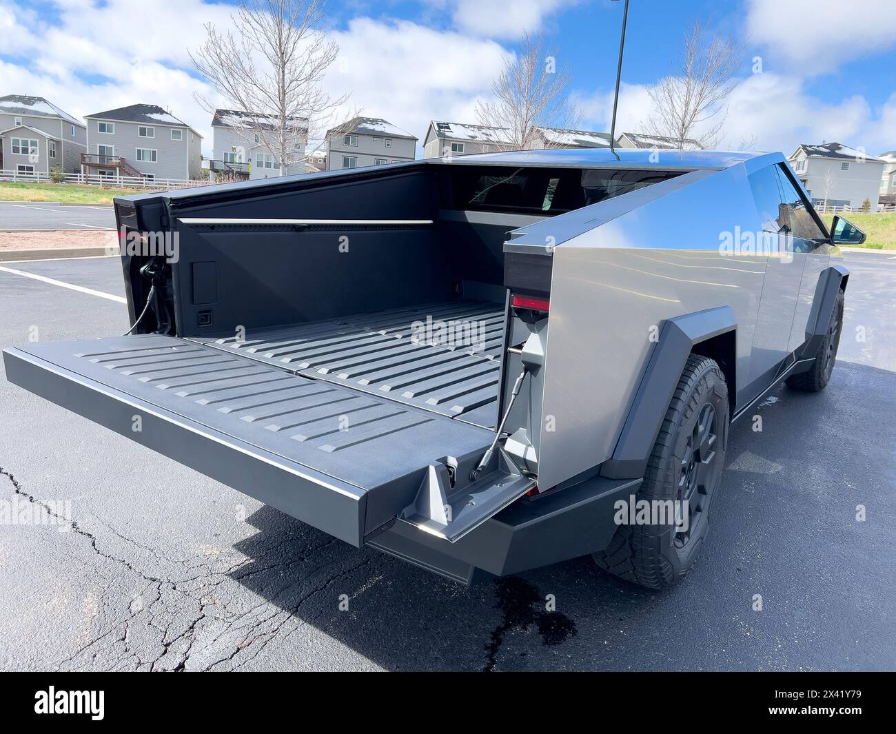 Back View of a Tesla Cybertruck in an Empty Suburban Parking Lot Stock ...