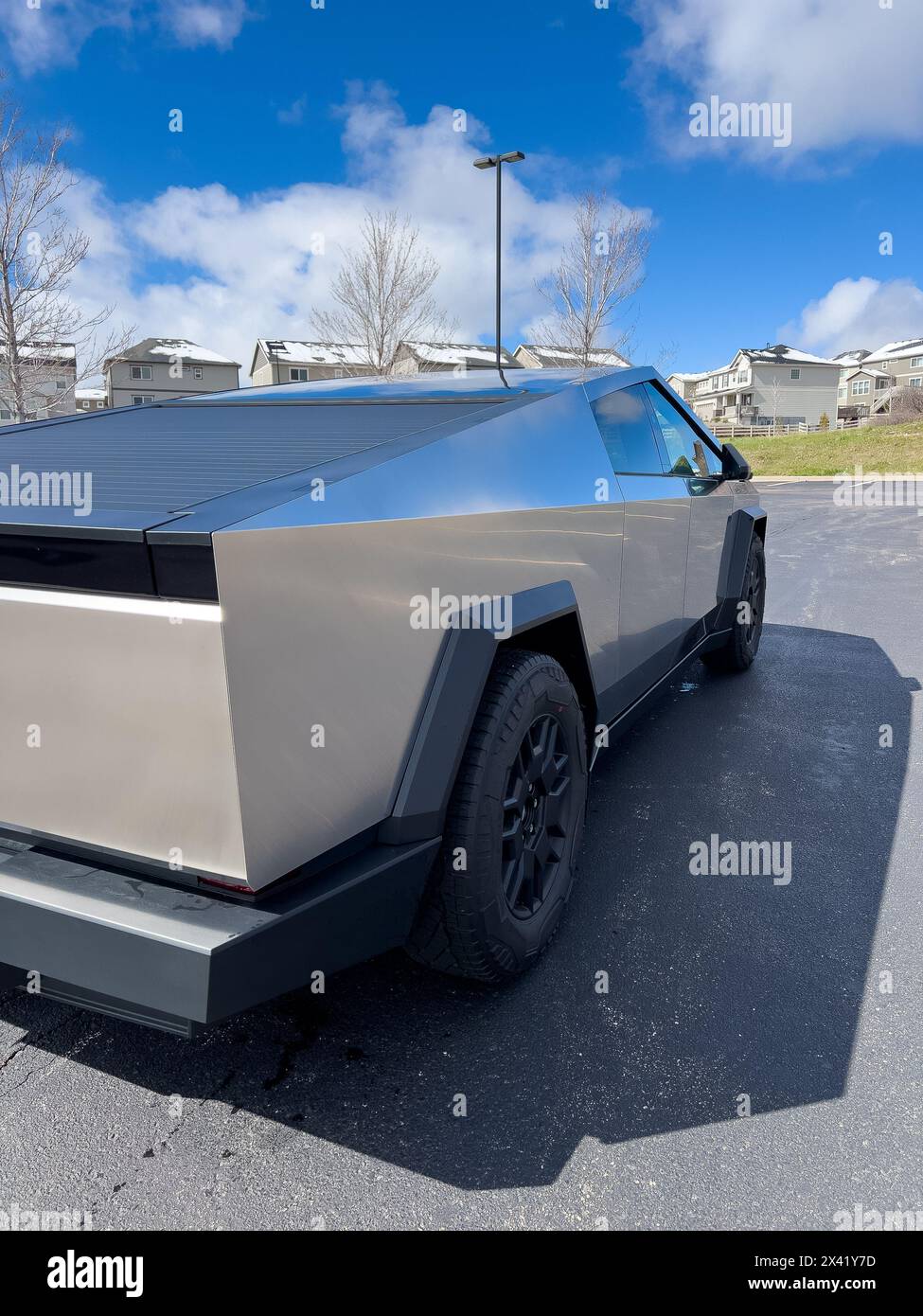 Back View of a Tesla Cybertruck in an Empty Suburban Parking Lot Stock ...