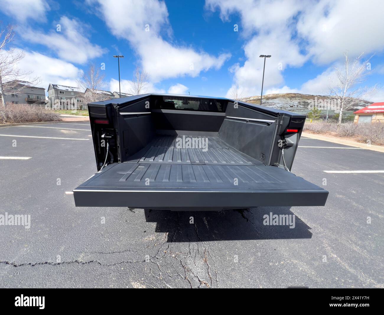 Back View of a Tesla Cybertruck in an Empty Suburban Parking Lot Stock ...