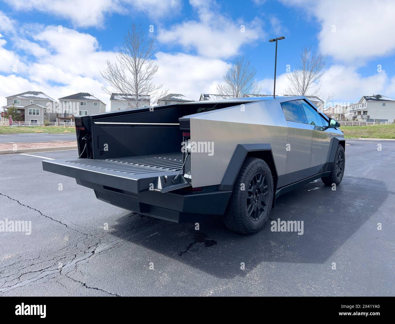 Back View of a Tesla Cybertruck in an Empty Suburban Parking Lot Stock ...