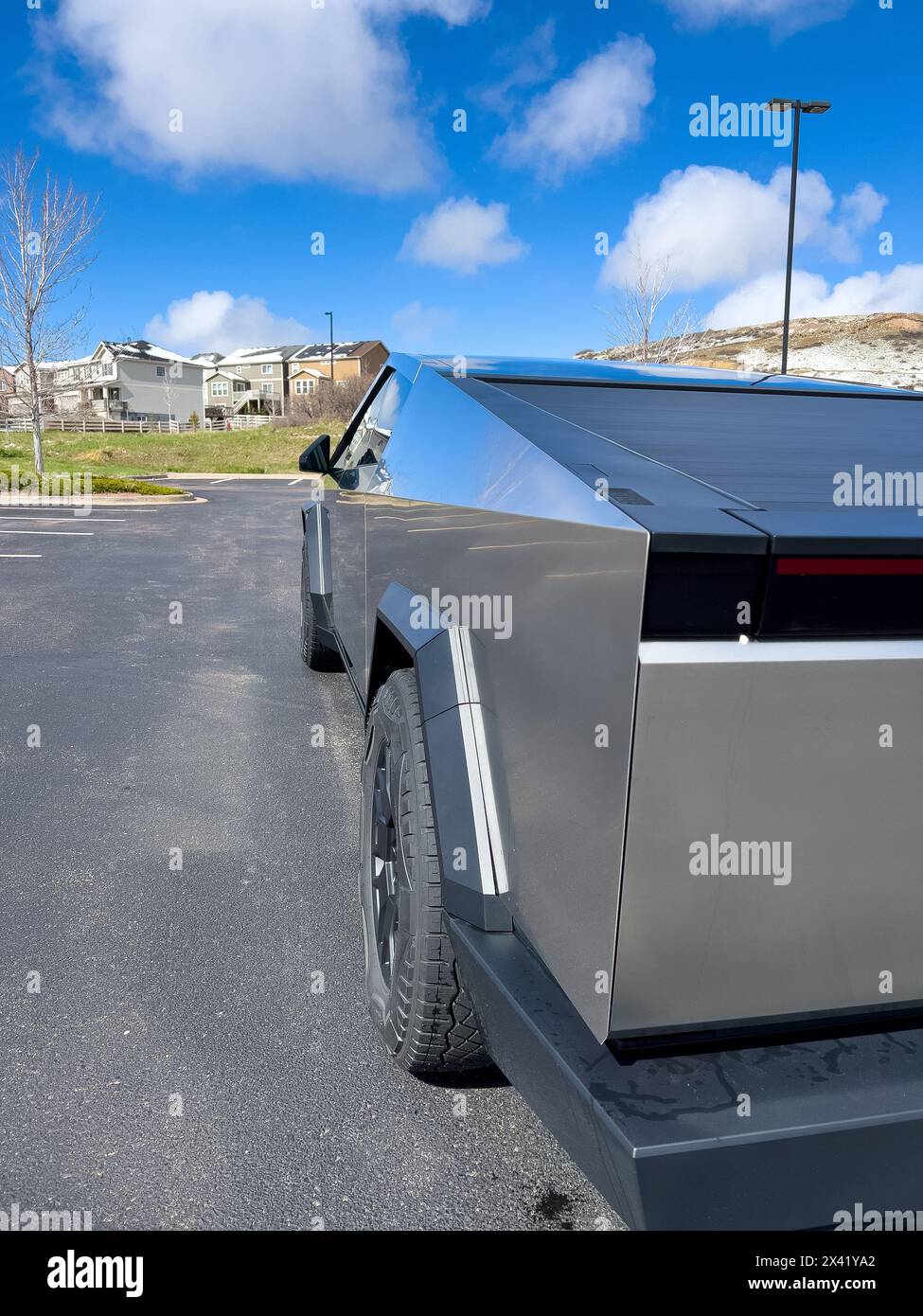 Back View of a Tesla Cybertruck in an Empty Suburban Parking Lot Stock ...