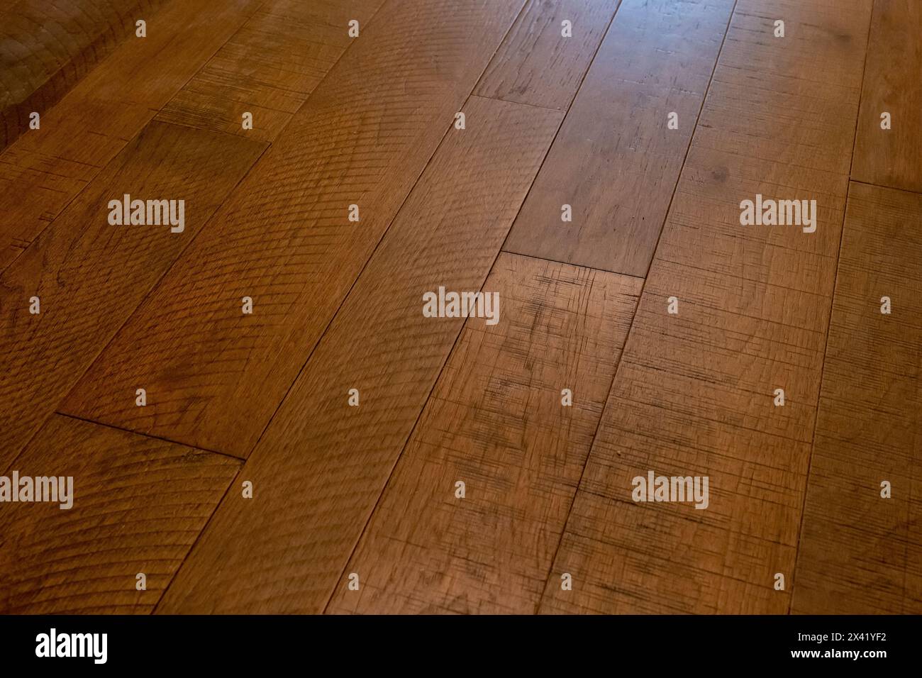 Hard wood natural floor for use as texture background, with planks at a ...
