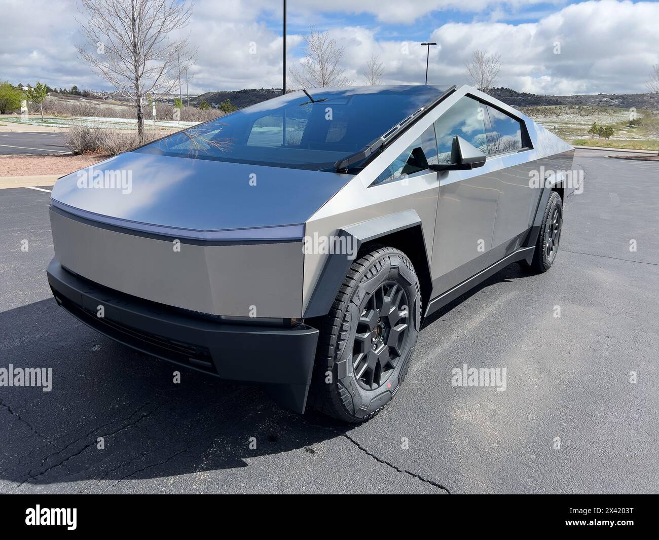 Front View of Tesla Cybertruck Parked Under Open Skies Stock Photo - Alamy