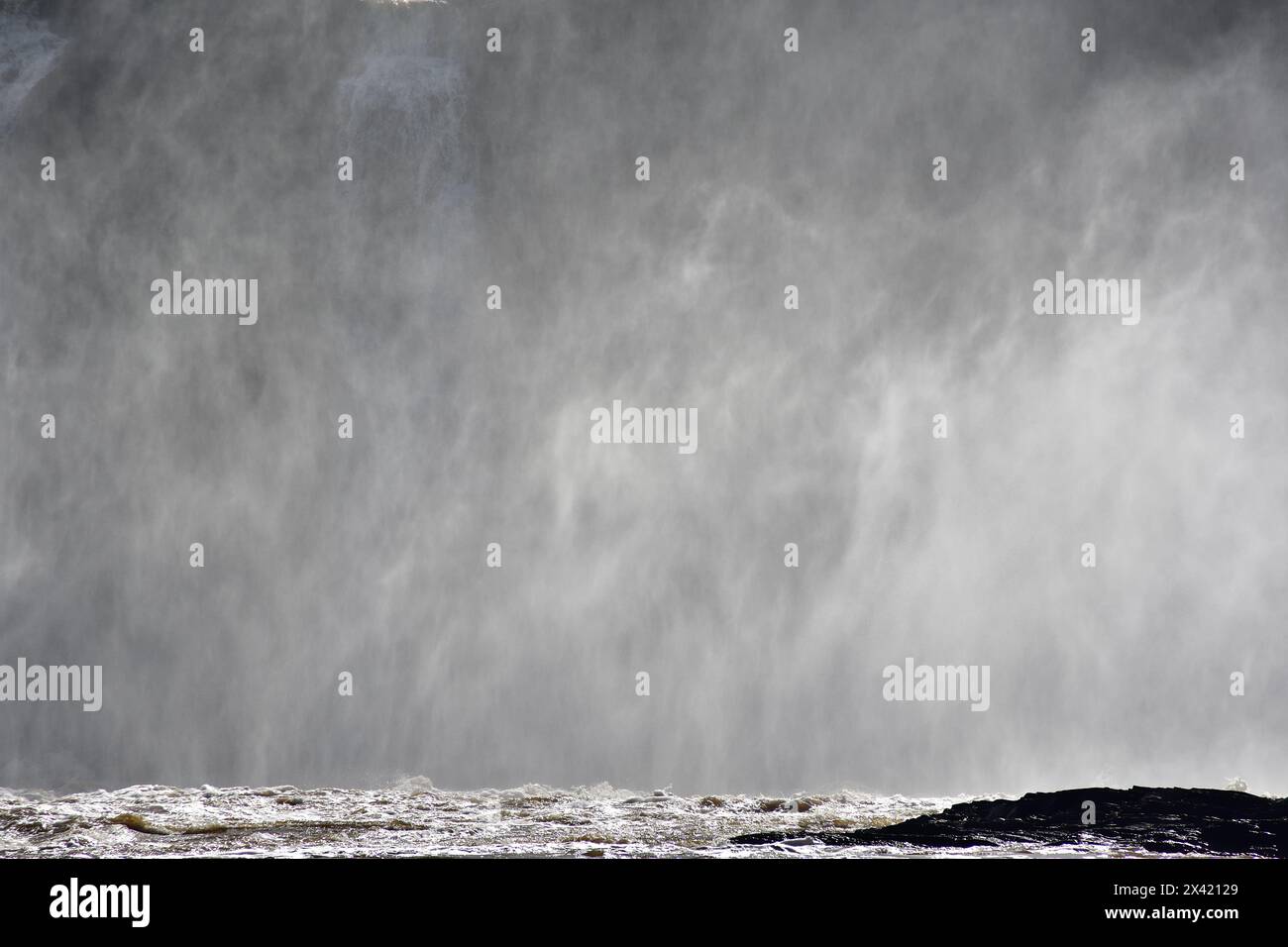 Water mist at waterfall drop point Stock Photo - Alamy