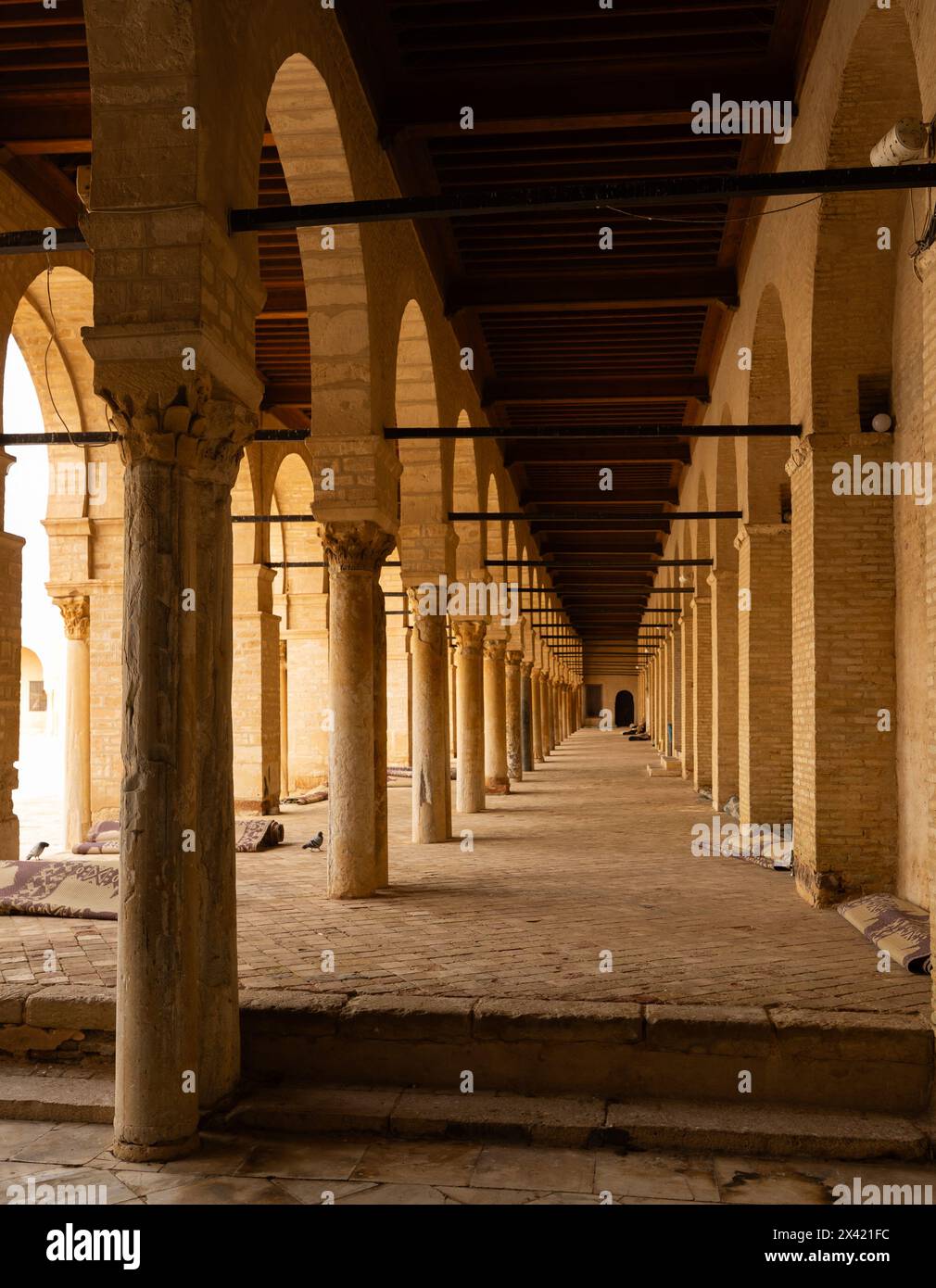 Corridor with arched colonnade in Mosque of Uqba in Kairouan Stock ...