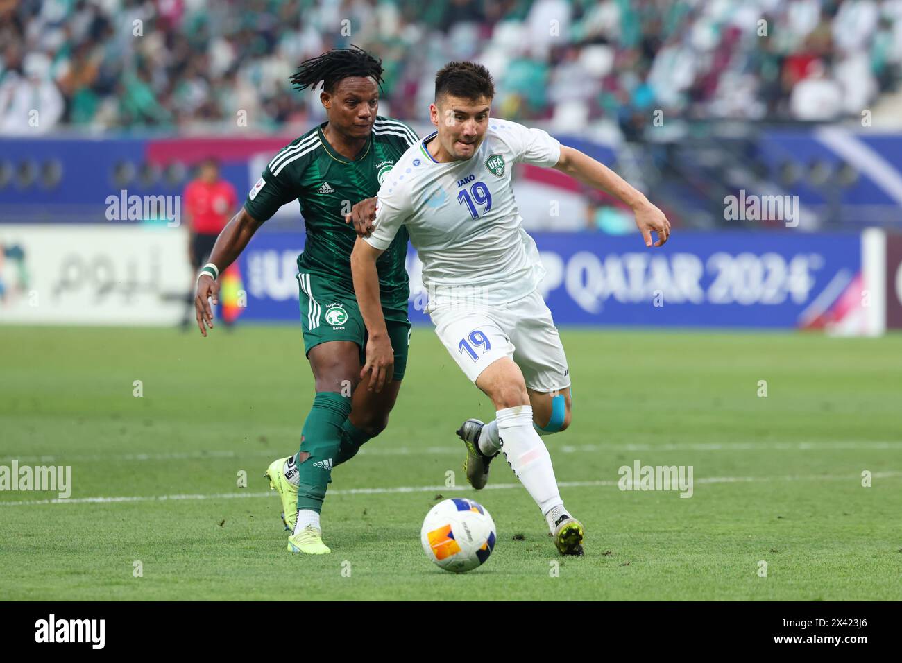 Doha, Qatar. 26th Apr, 2024. (L-R) Rayan Hamed (KSA), Husain Norchaev ...
