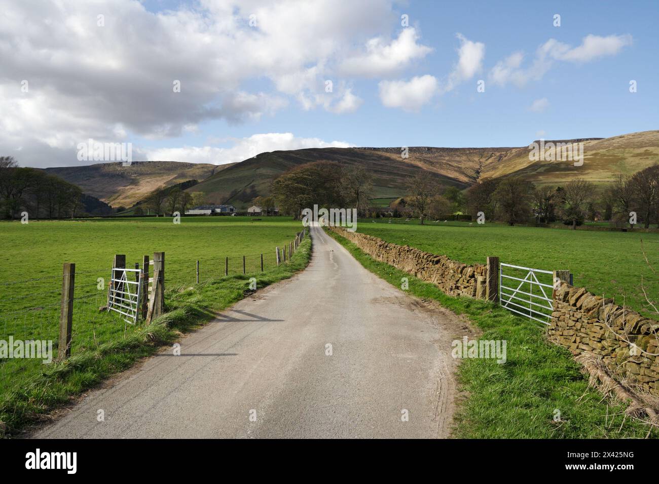 Scenic country lane road leading to Ollerbrook Booth, Edale village in ...