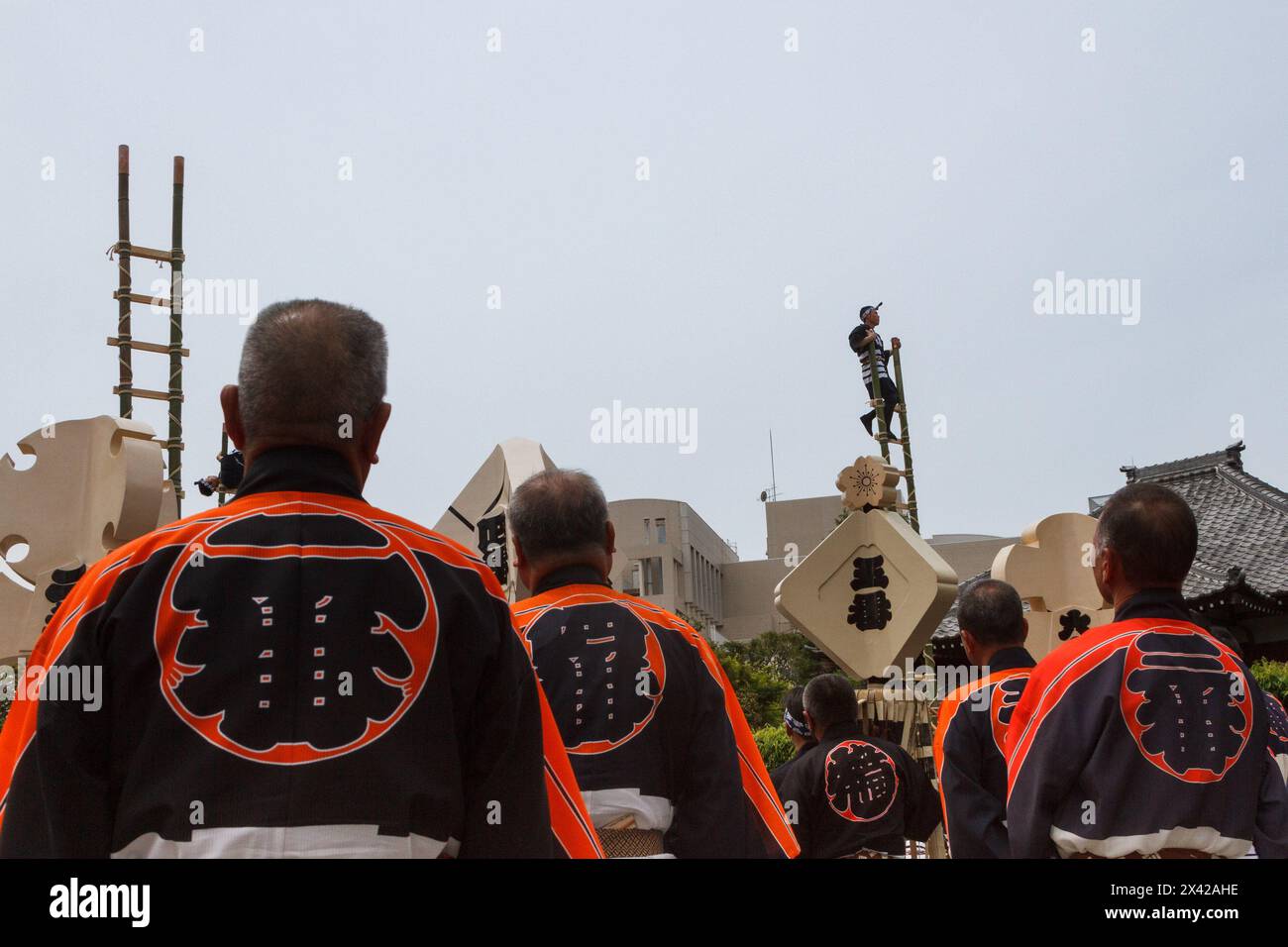 Tokyo, Japan. 29th Apr, 2024. Men wearing festival jackets take part in ...