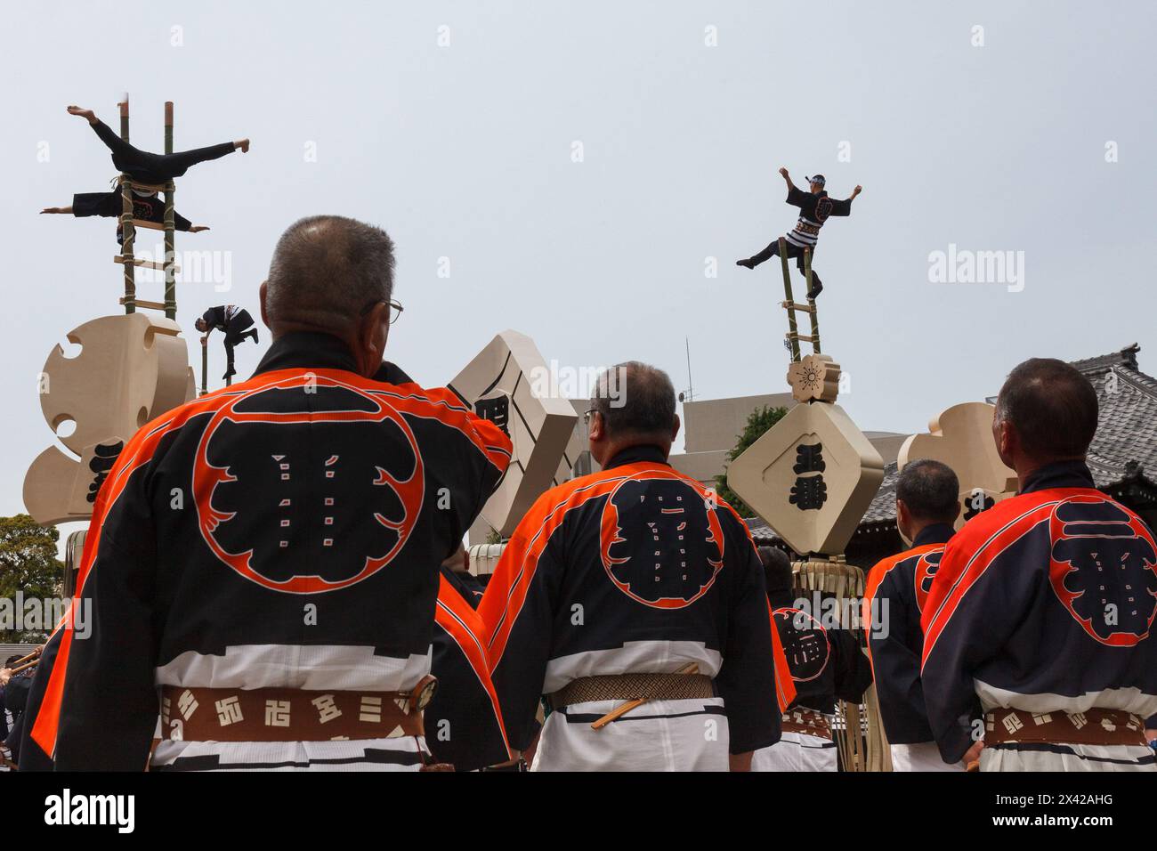 Tokyo, Japan. 29th Apr, 2024. Men wearing festival jackets take part in ...