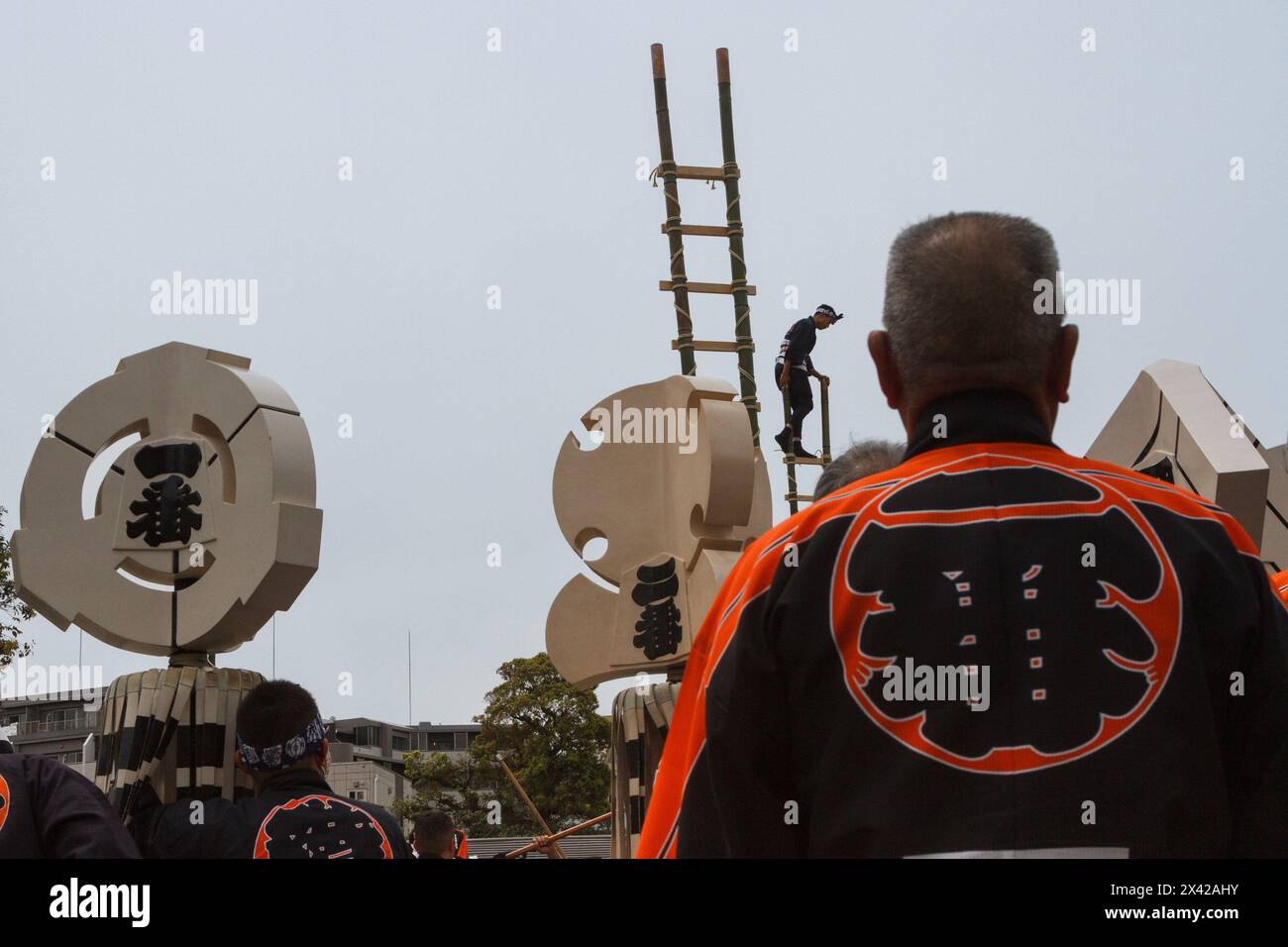 Tokyo, Japan. 29th Apr, 2024. Men wearing festival jackets take part in ...