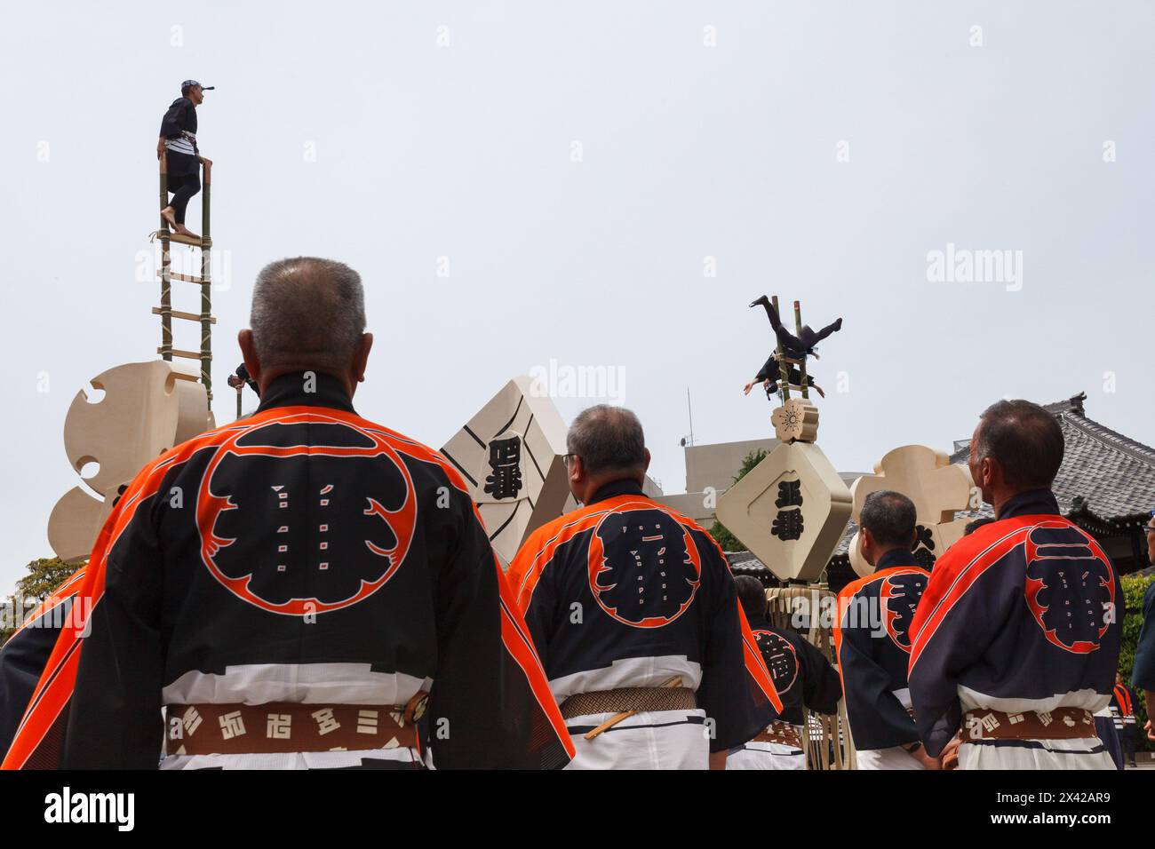 Tokyo, Japan. 29th Apr, 2024. Men wearing festival jackets take part in ...