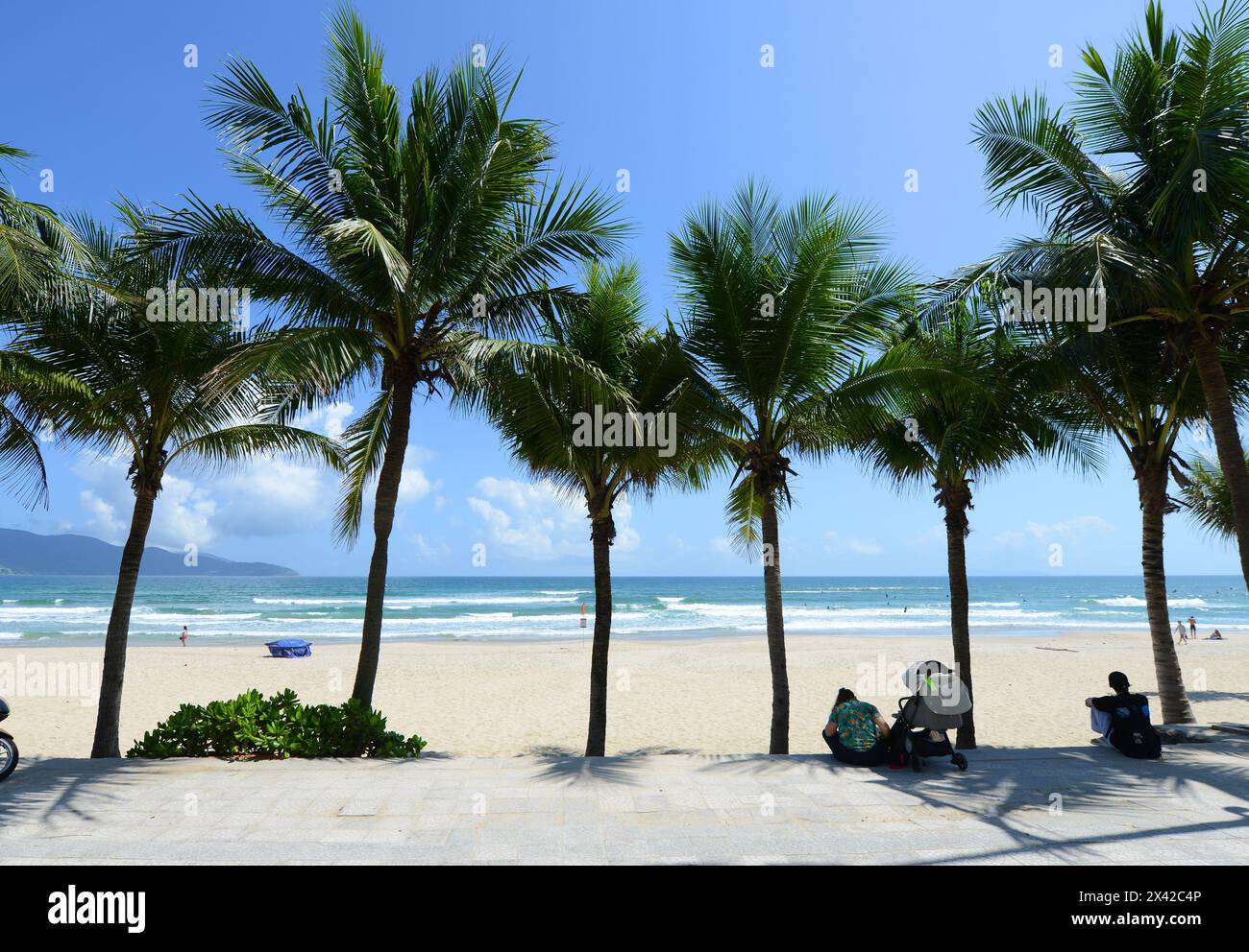 Walking along the beachfront promenade in Da Nang, VIetnam Stock Photo ...