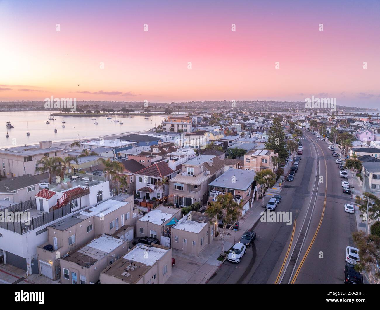 Aerial view of colorful sunrise sky over Mission Beach San Diego with ...