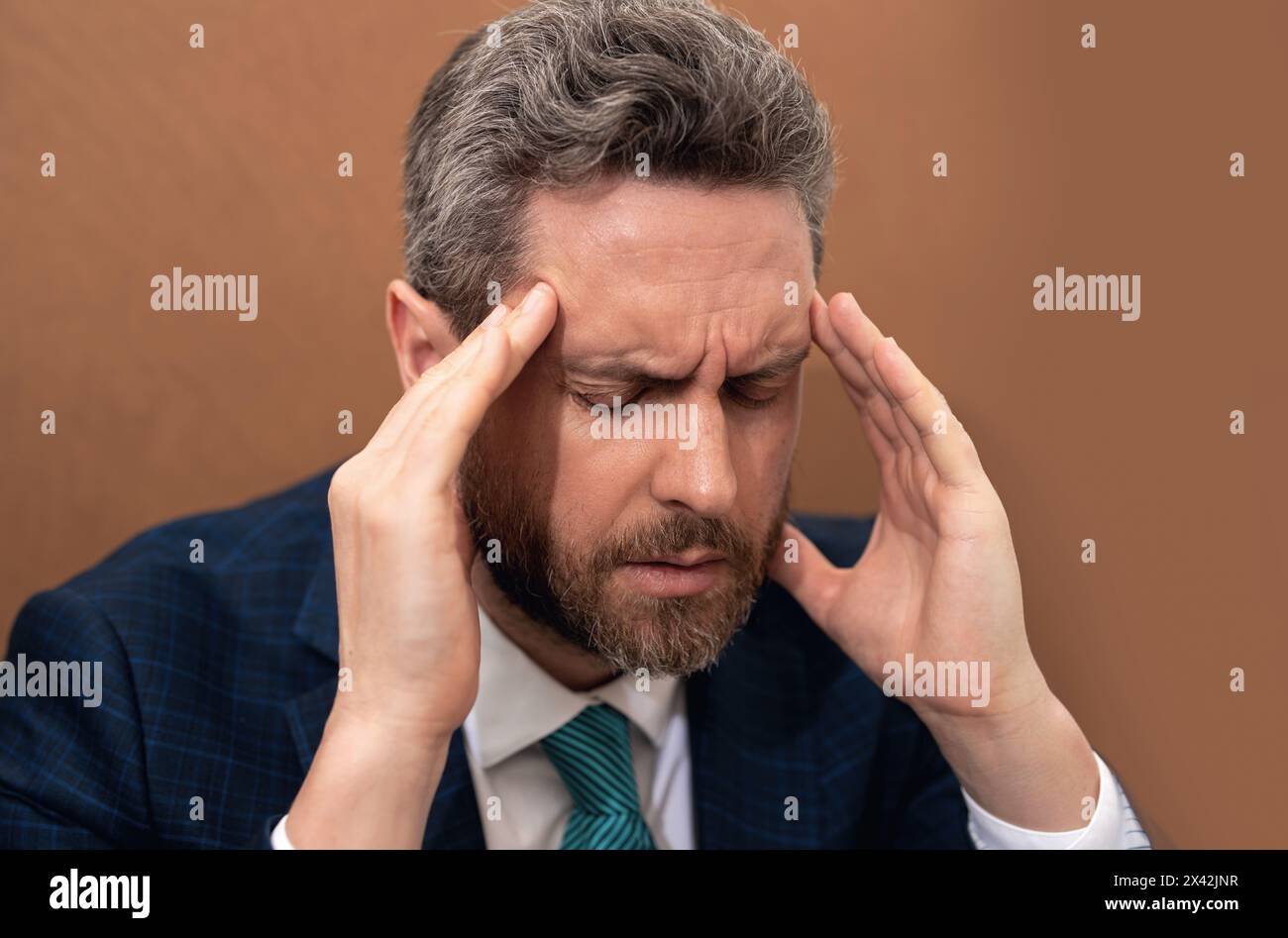 Headache and eye strain on laptop. Business man with stress and fatigue ...