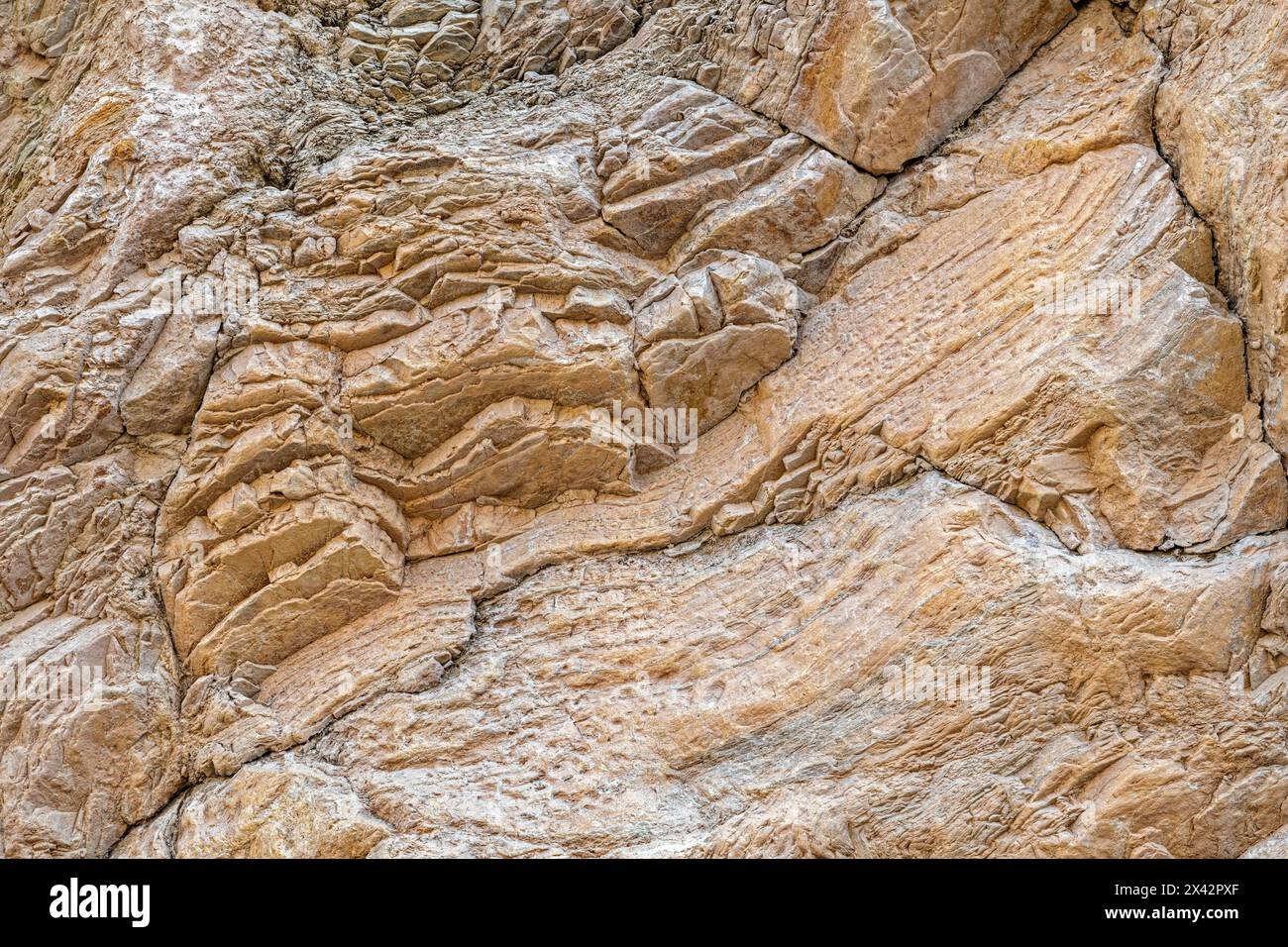 Layered patterns of are erosion evident in the rock walls lining Titus ...
