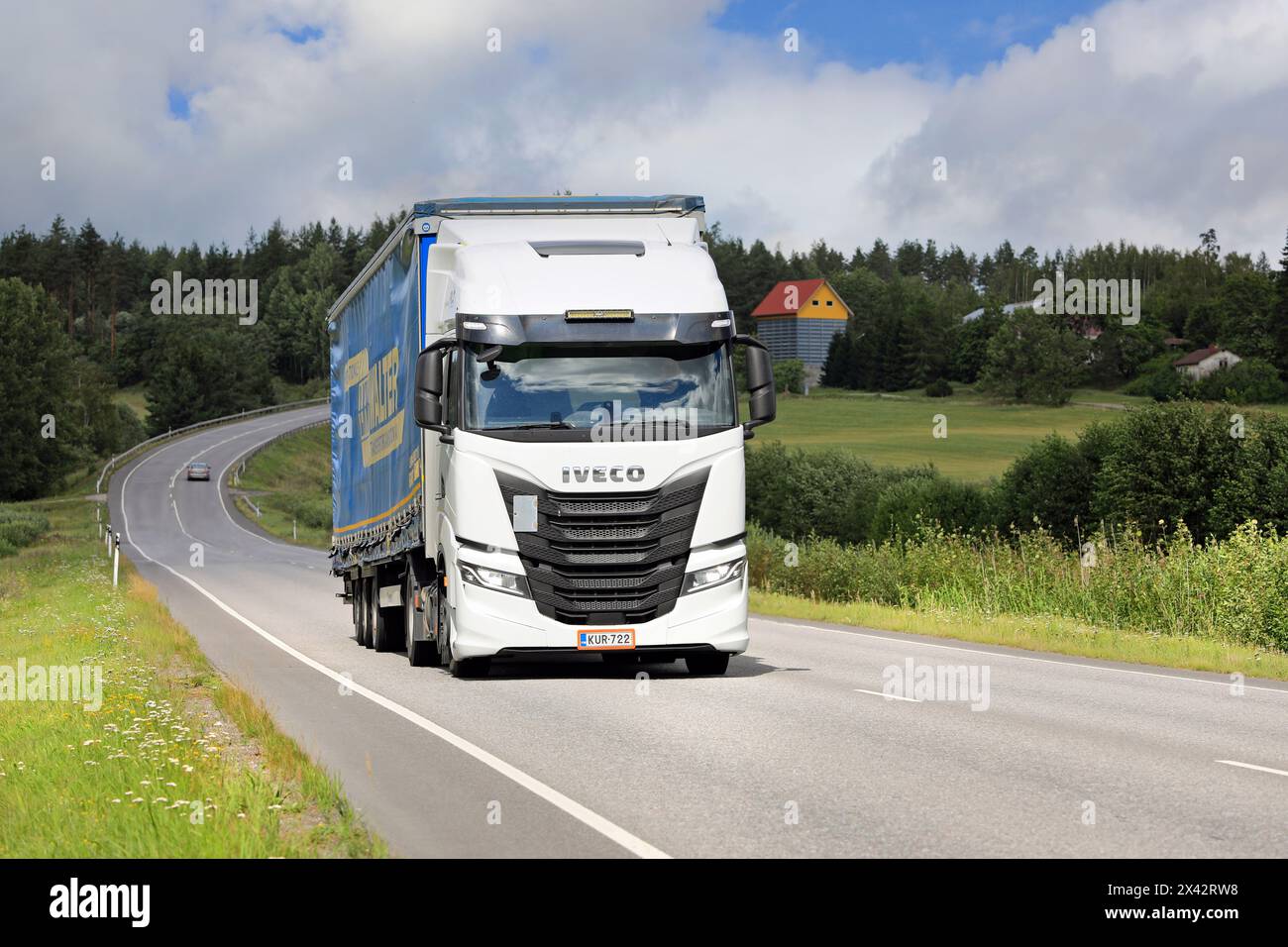 New, white Iveco S-Way truck pulls LKW Walter freight trailer along ...