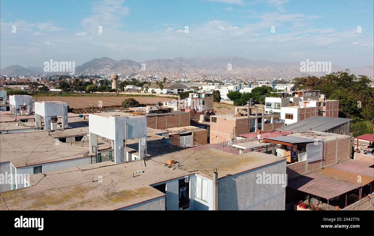 Aerial view of a sprawling urban area with residential buildings and ...