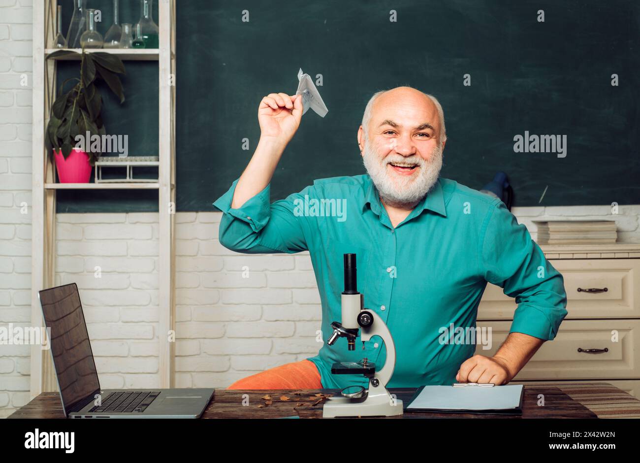 Good teachers enjoy teaching. Teacher preparing for university exams ...