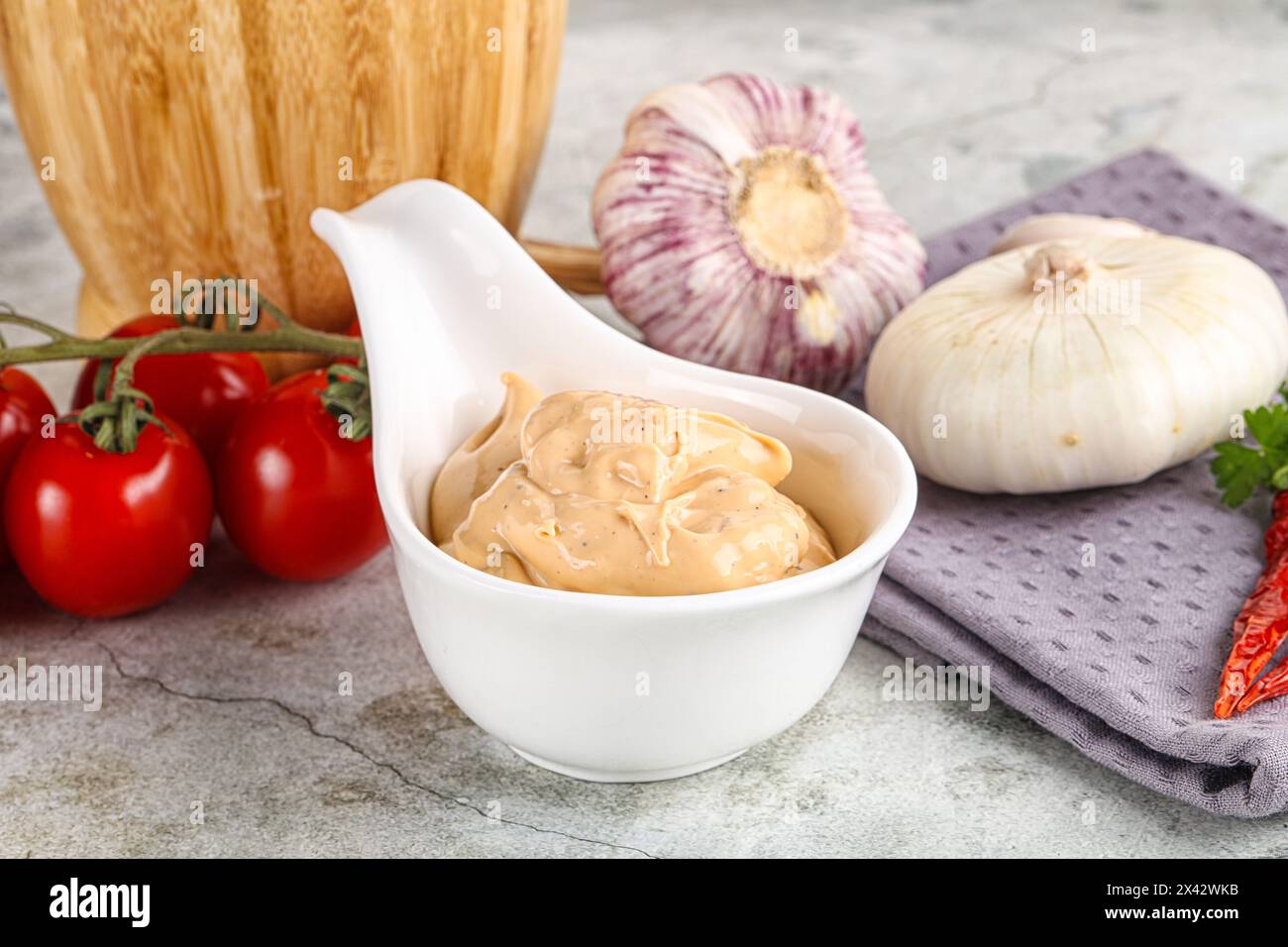 Bowl of Yellow cream grill sauce for burger Stock Photo - Alamy