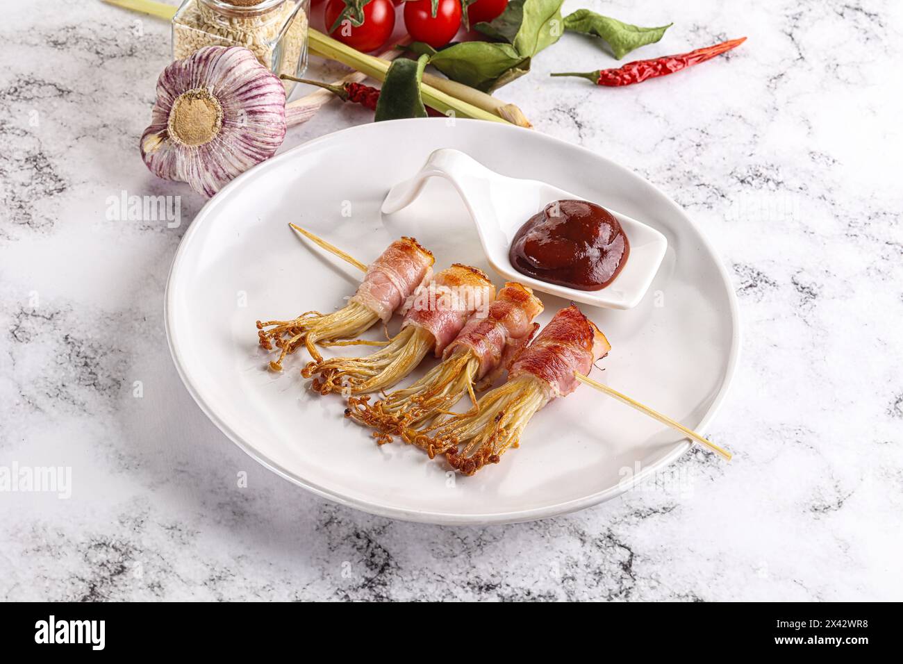Tasty Grilled enoki mushroom with bacon Stock Photo - Alamy