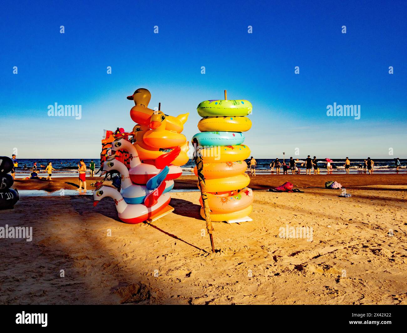 people and colourful float on beach holiday weekend in Vung Tau Vietnam ...