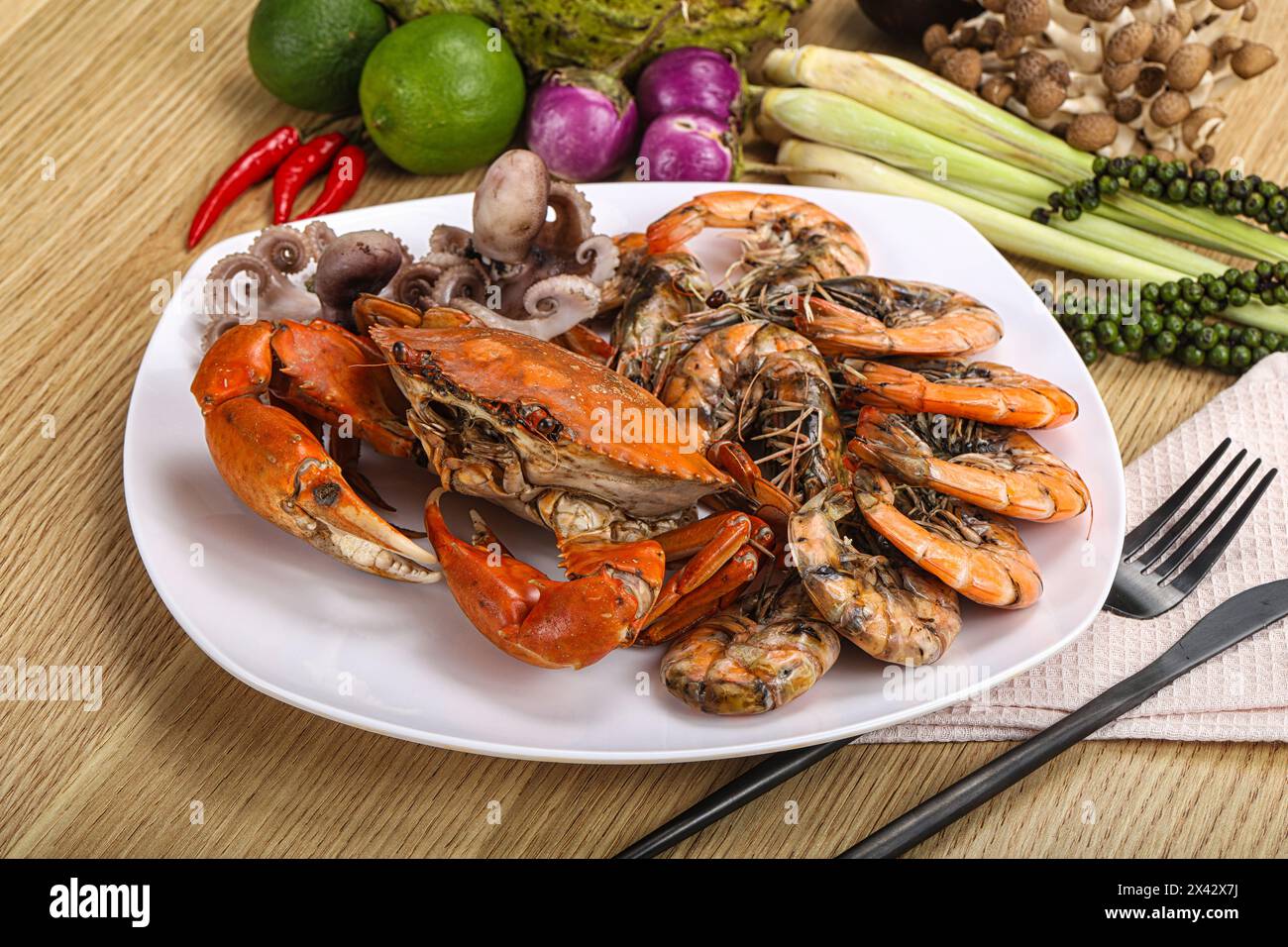 Luxury seafood mix - crab, tiger prawn, octopus Stock Photo - Alamy