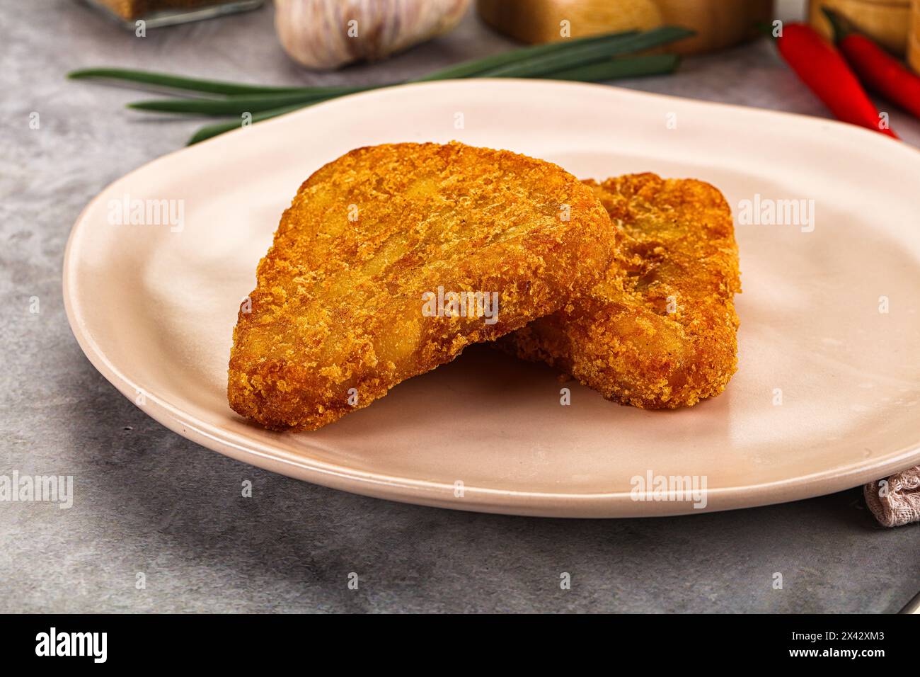 Fried potato hash brown snack for breakfast Stock Photo - Alamy