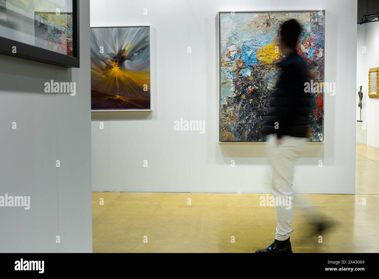People Walking and Admiring Paintings in a Modern Art Gallery Stock ...