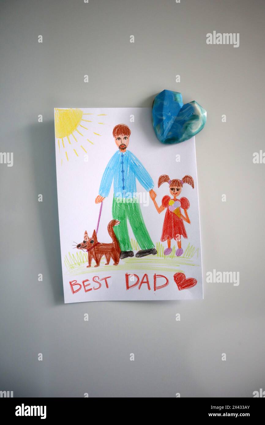 Photo postcard to the Best Dad drawn by a child. Attached with a blue ...